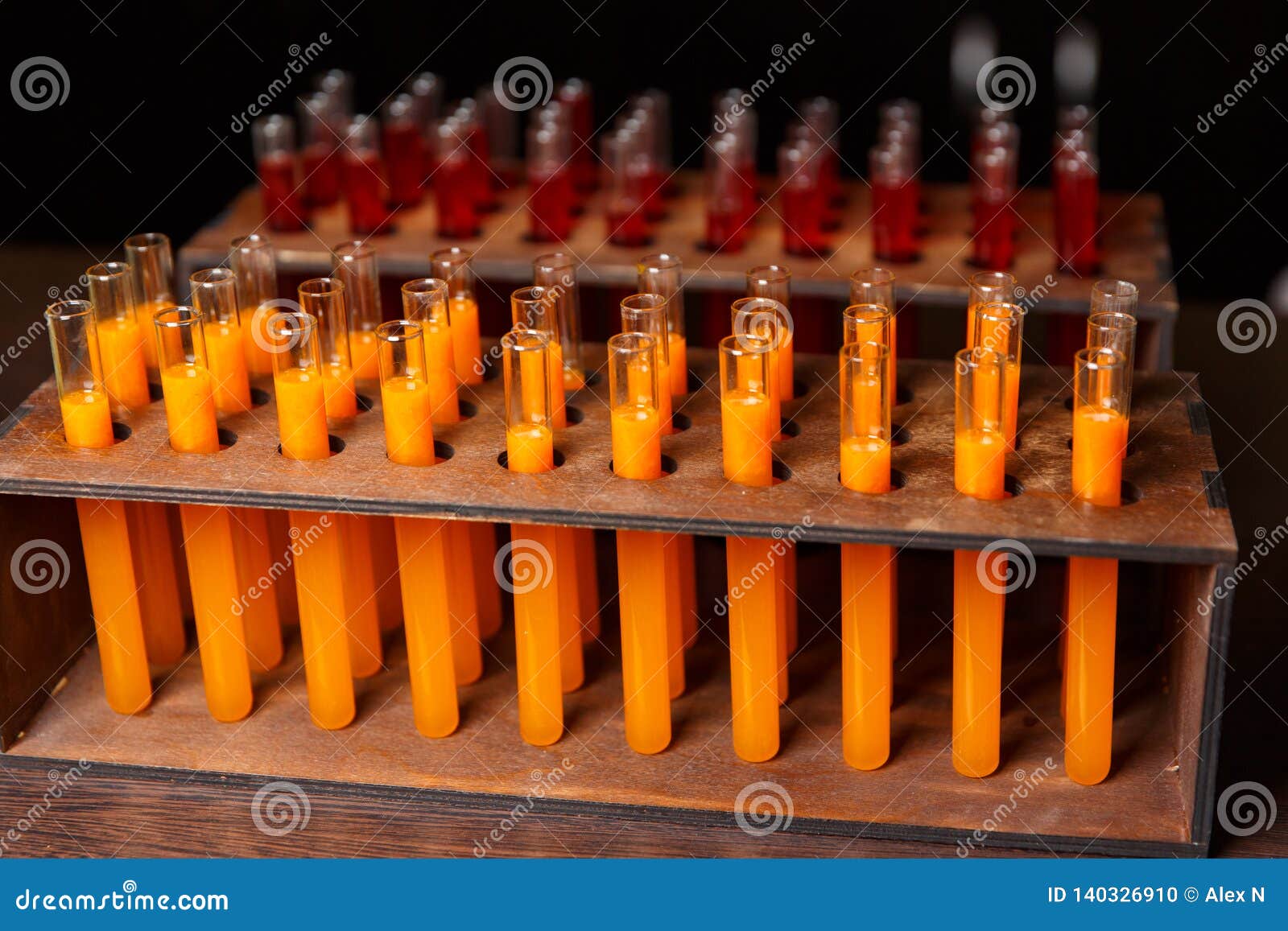 Photo of Test Tubes with Orange Liquid Stock Photo - Image of chemical ...