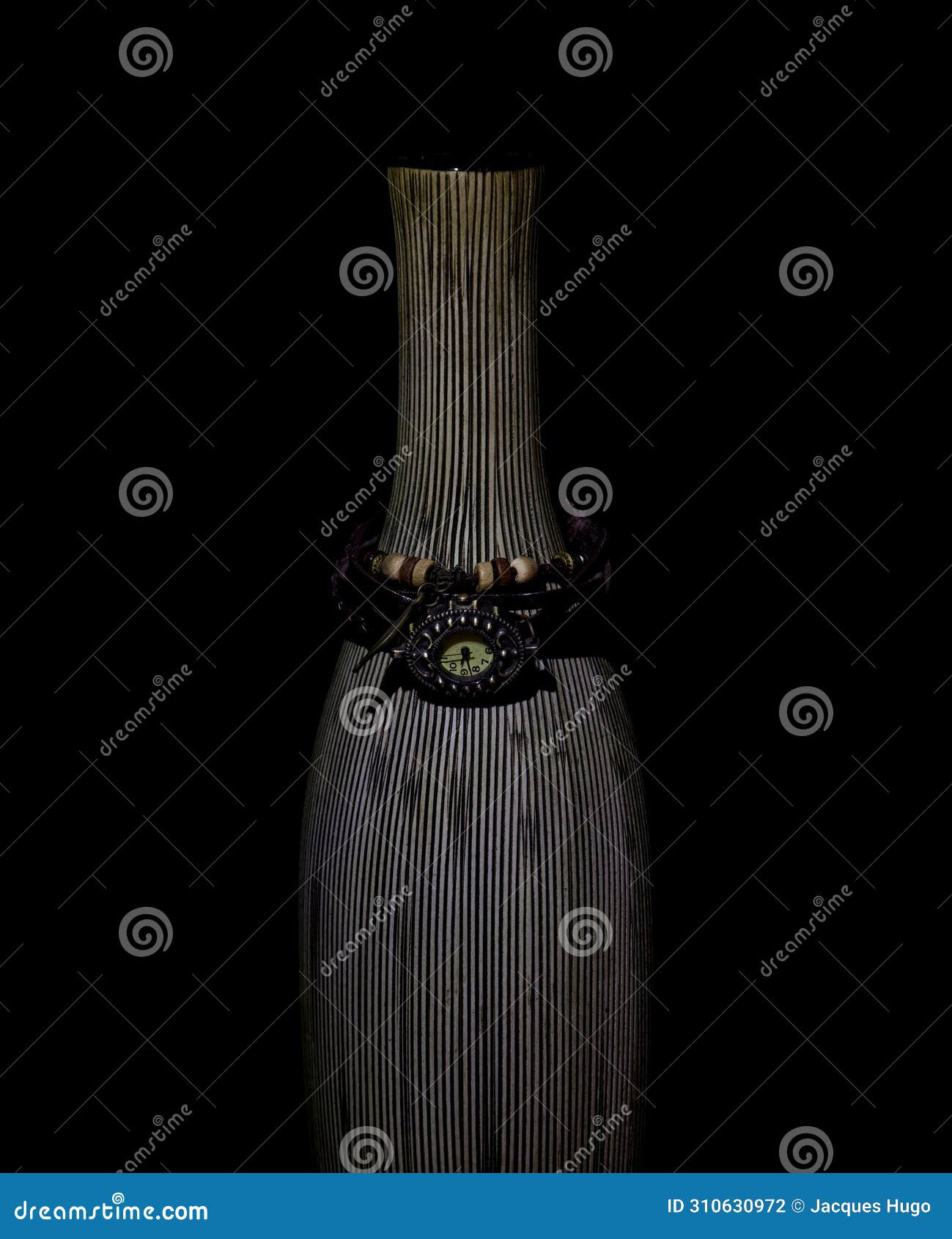 A Photo of a Textured Bottle Against a Black Background. Stock Photo ...