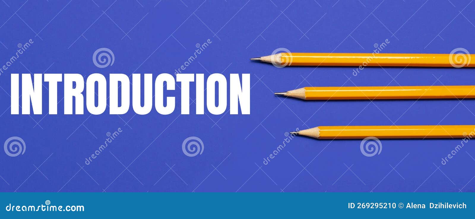 Photo of Three Orange Pencils on a Blue Background with the Text ...