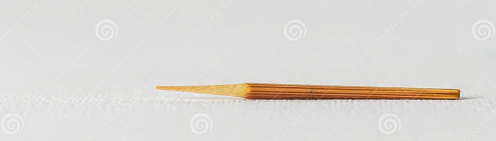 Photo of a Toothpick on a White Background Highlighting Its Sharp Tip ...