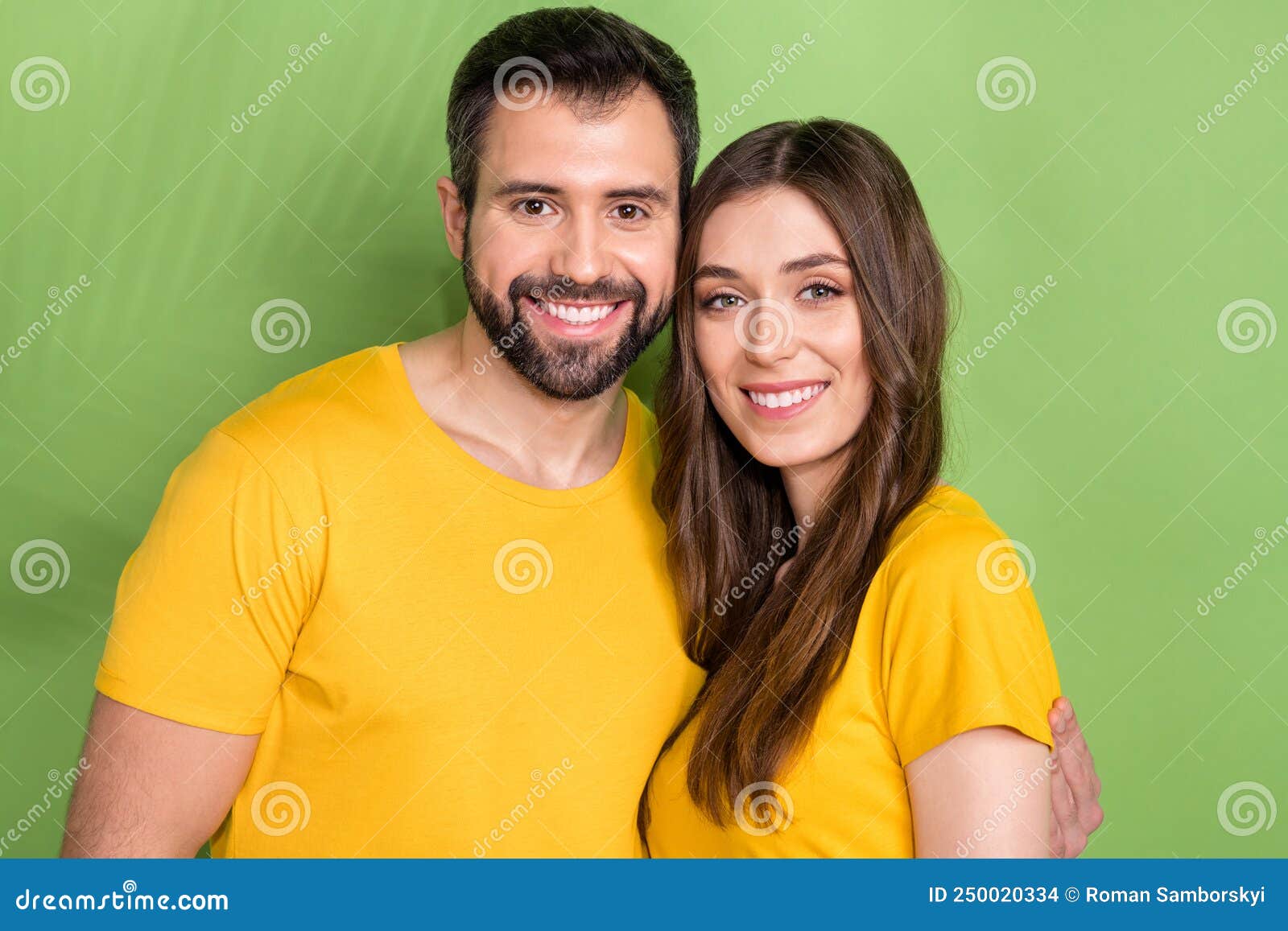 Photo Of Two Cheerful Positive Partners Cuddle Toothy Beaming Smile