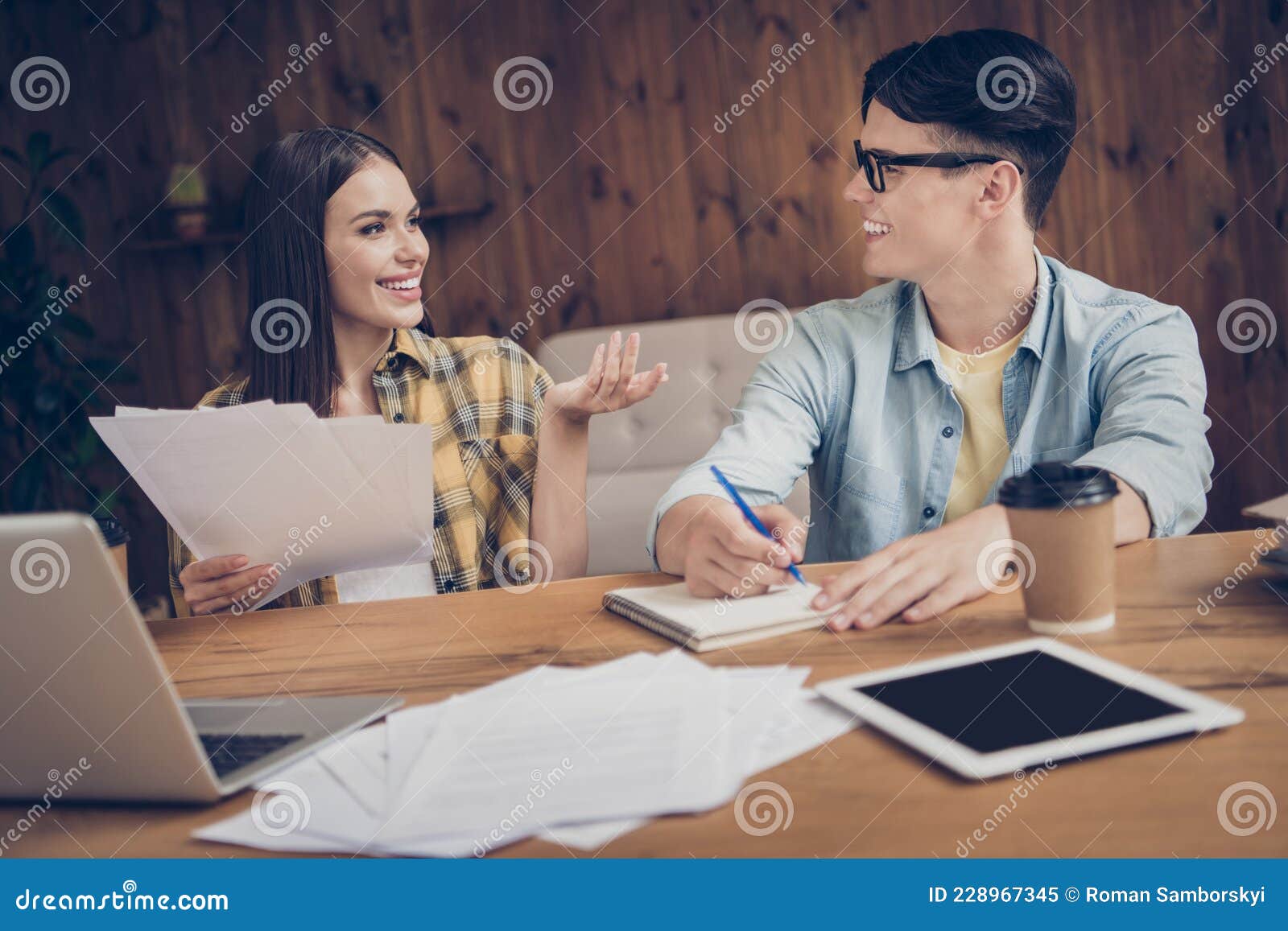 Photo of Two College Students Classmates Talking Analyzing Homework ...