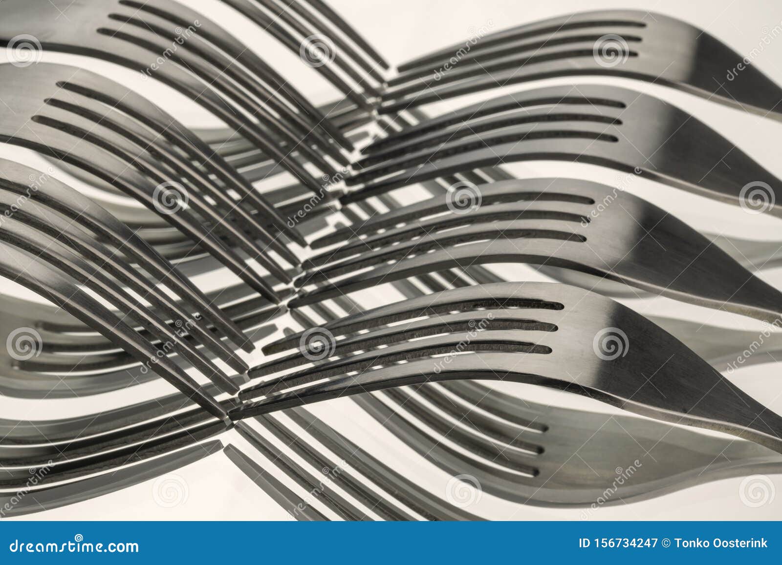 Photo of Wavy Forks on a Mirror Stock Image - Image of concept, inside ...