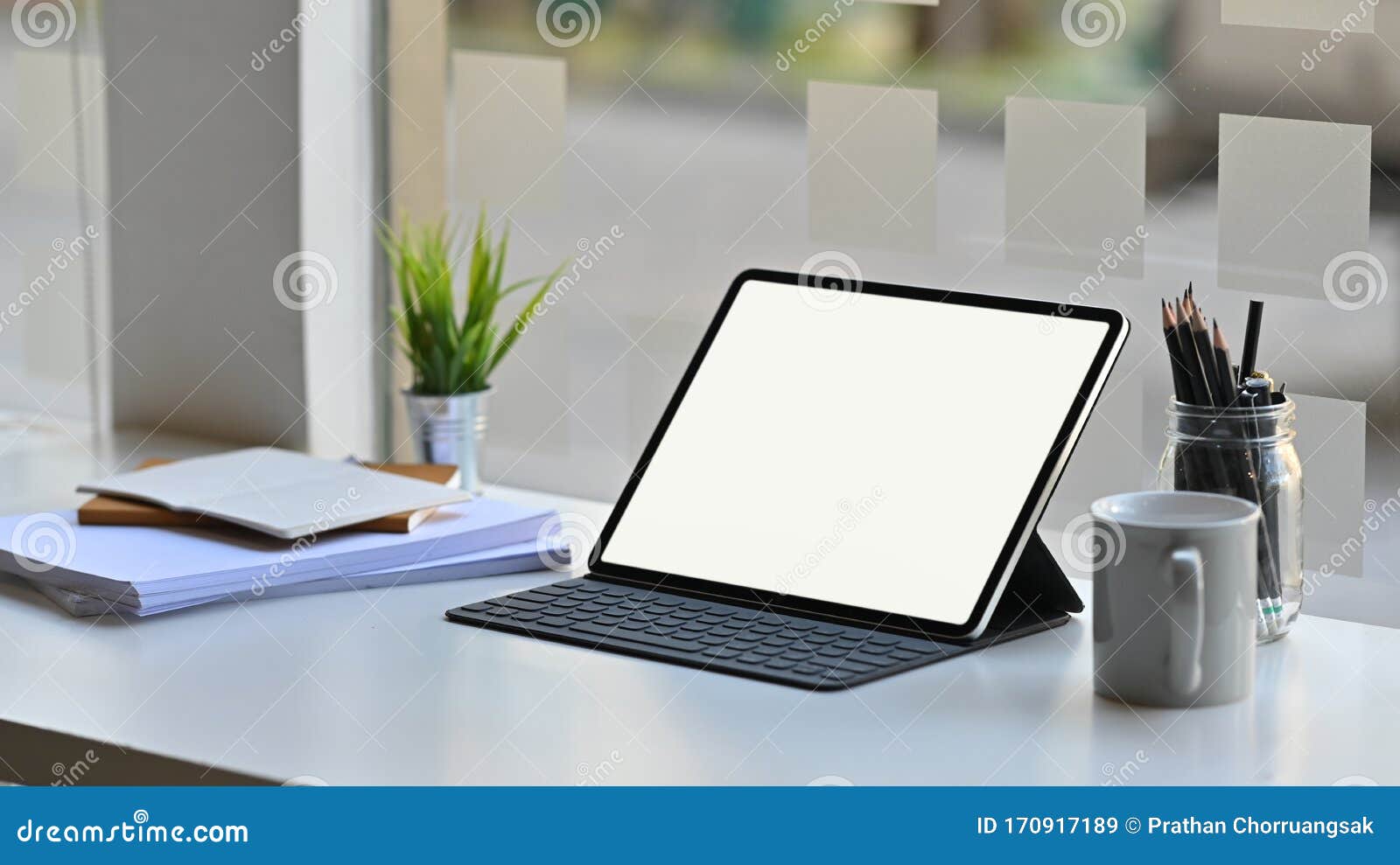 Photo of White Blank Screen Computer Tablet in a Leather-case and ...