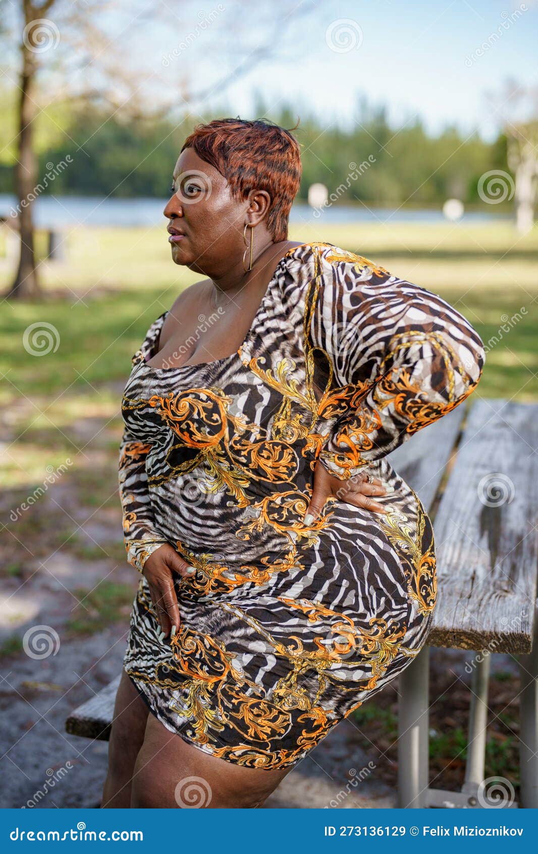 Photo of a Young Beautiful Plus Size Model Posing Outdoors in Nature ...