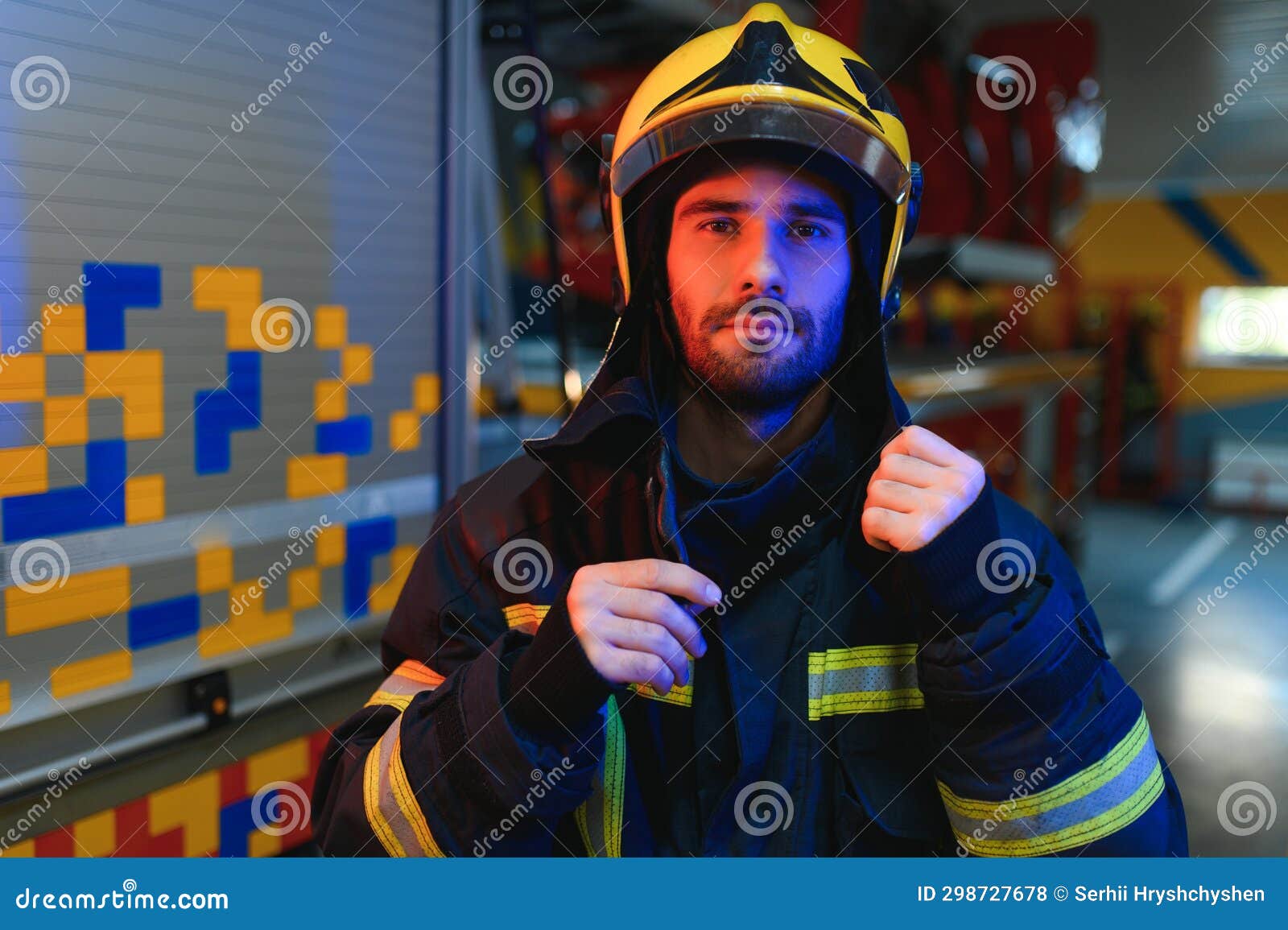 Photo of Young Fireman Near Fire Engine Stock Photo - Image of ...