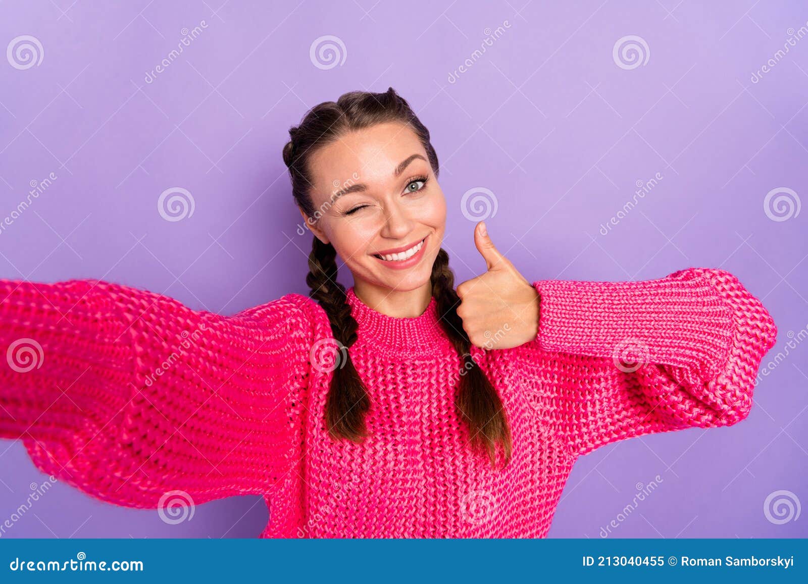 Photo Of Young Pretty Cheerful Smiling Girl Wink Blink Eye Showing