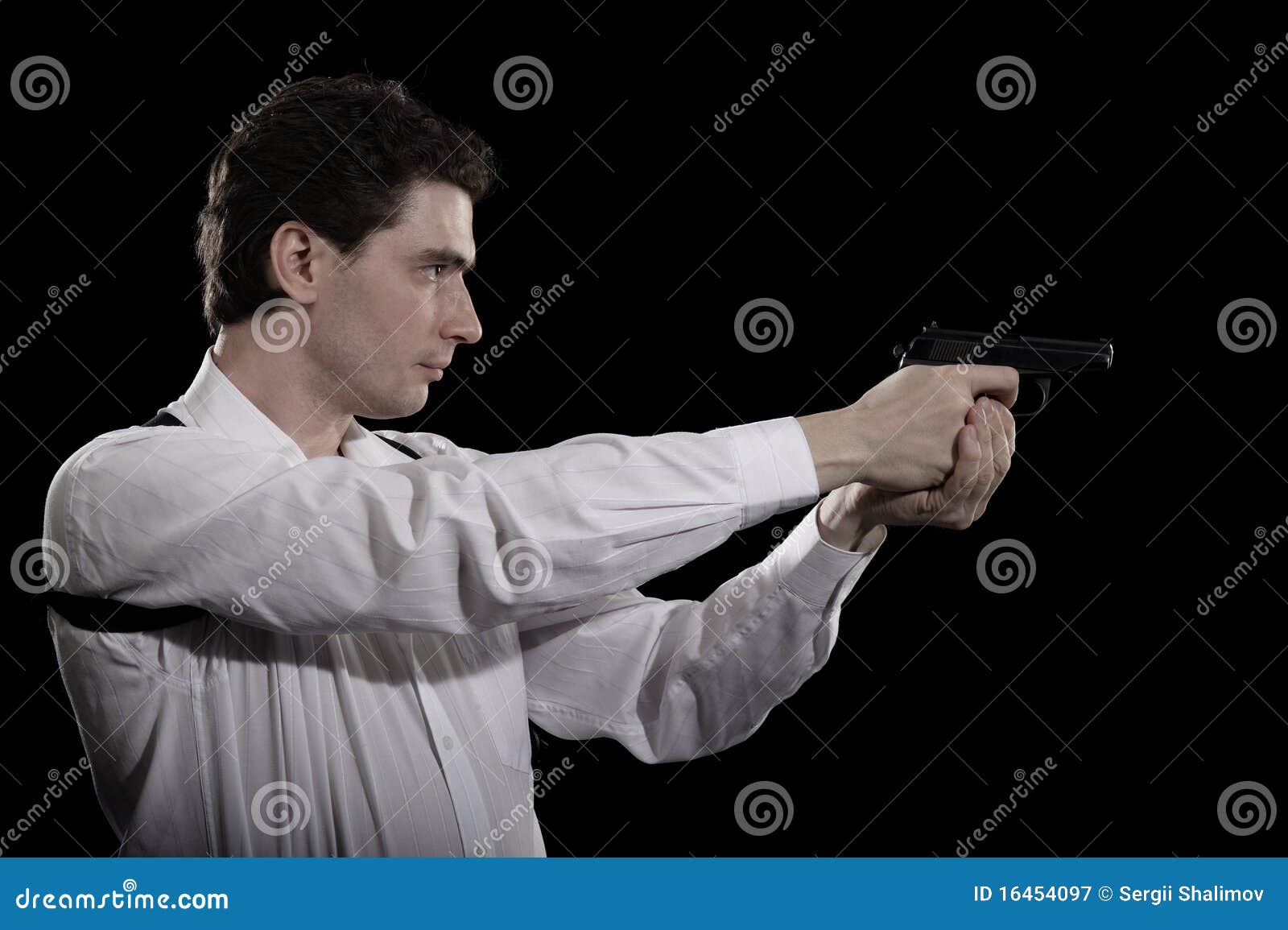 Photo yuong man with gun stock image. Image of pistol - 16454097