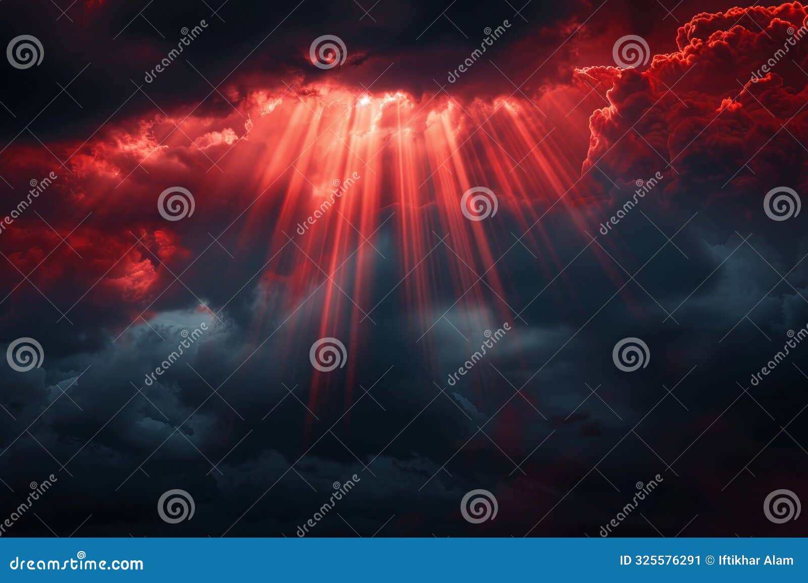 A Photograph of a Dark Sky with Glowing Red Light Rays Shining through ...