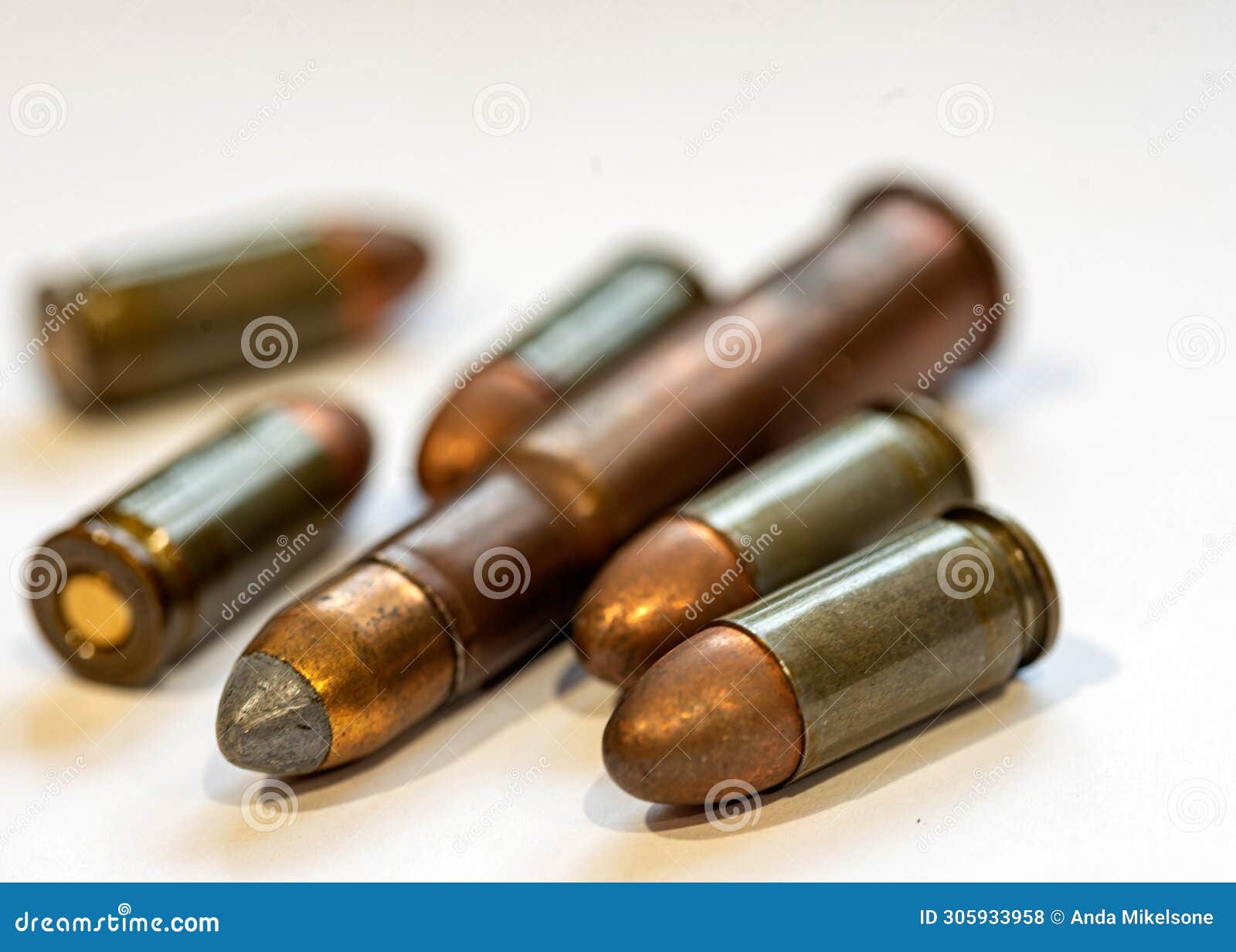 Photograph of Fired Bullets and Cartridges Stock Photo - Image of ...