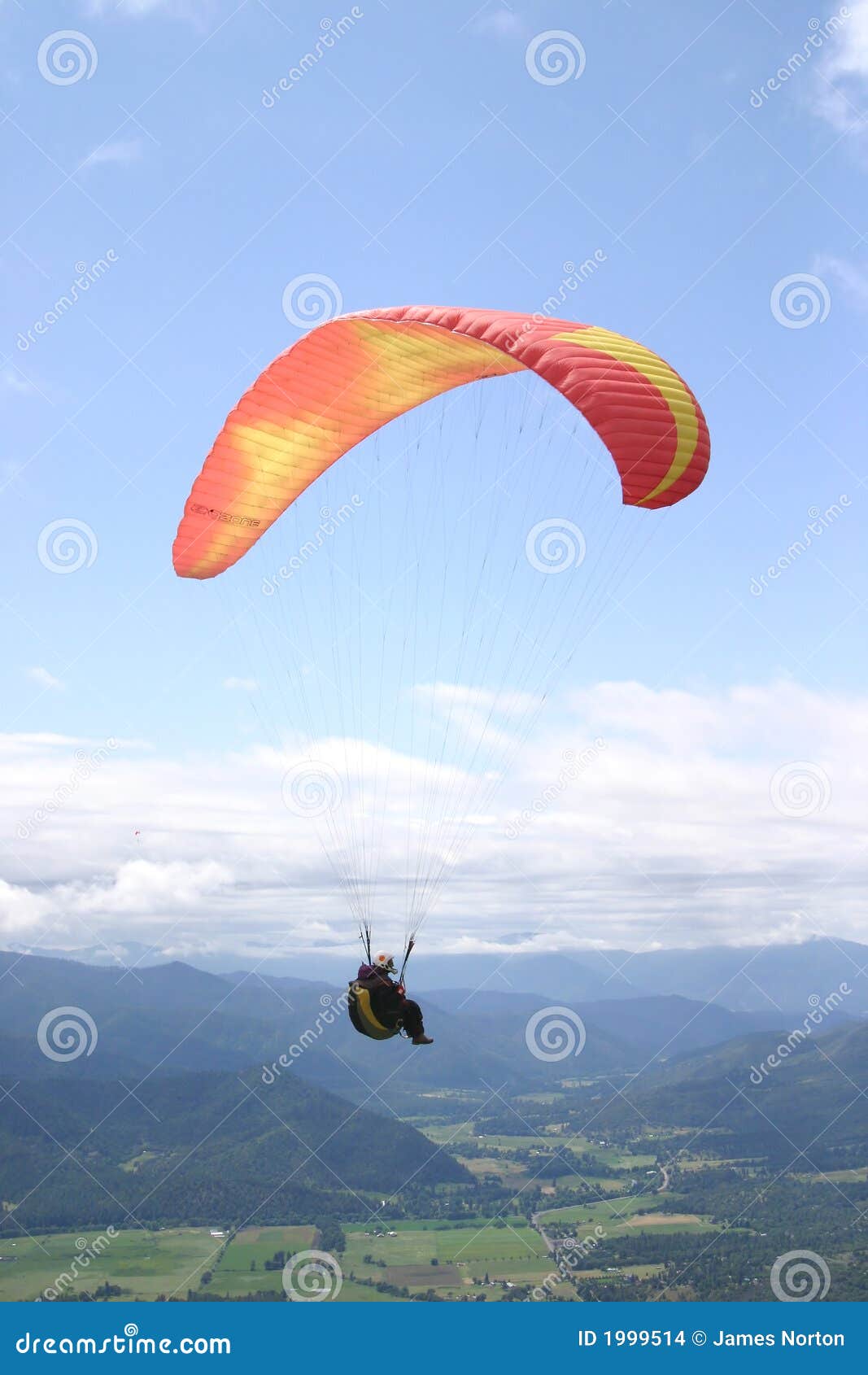 Photograph of a Paraglider Pilot Soaring Stock Photo - Image of pilot ...