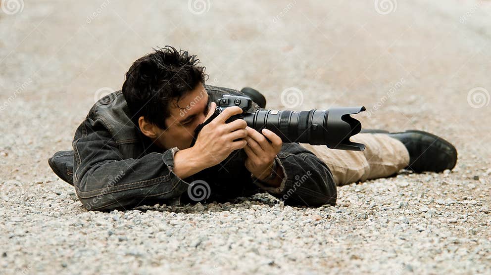 Photographer stock image. Image of shoot, lens, male, shooting - 4695631