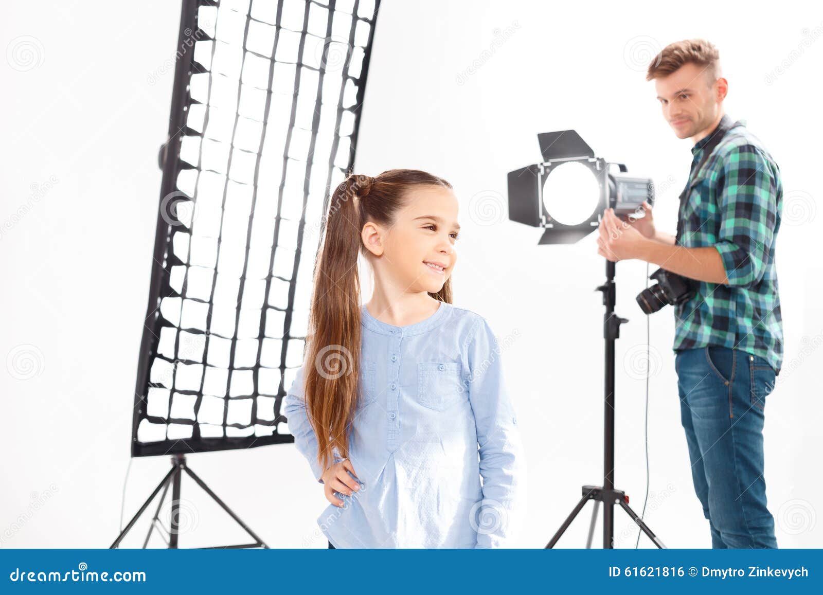 Photographer Adjusts Lighting during Shooting Stock Photo - Image of ...