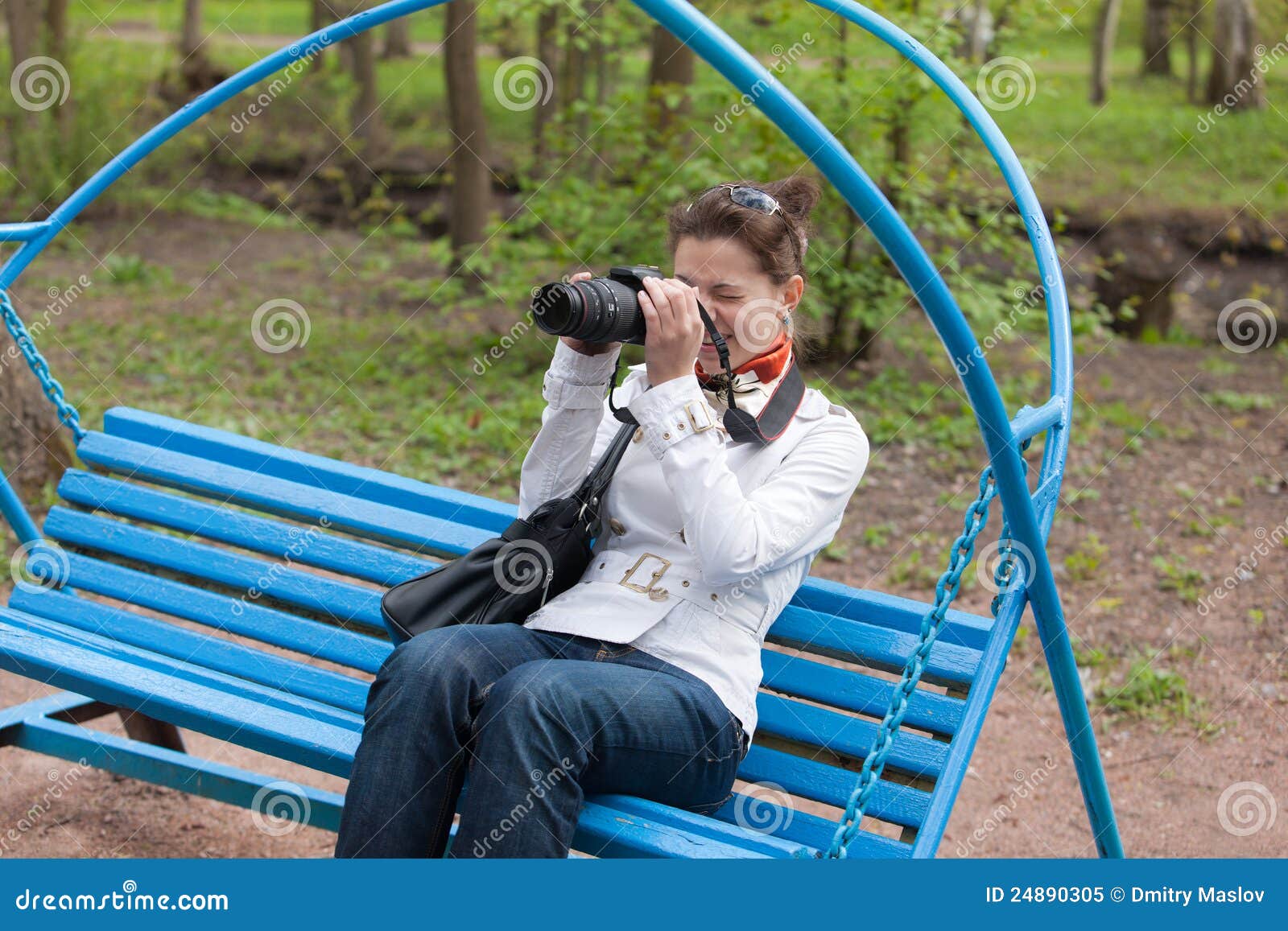 The Photographer on a Bench Stock Image - Image of young, attractive ...