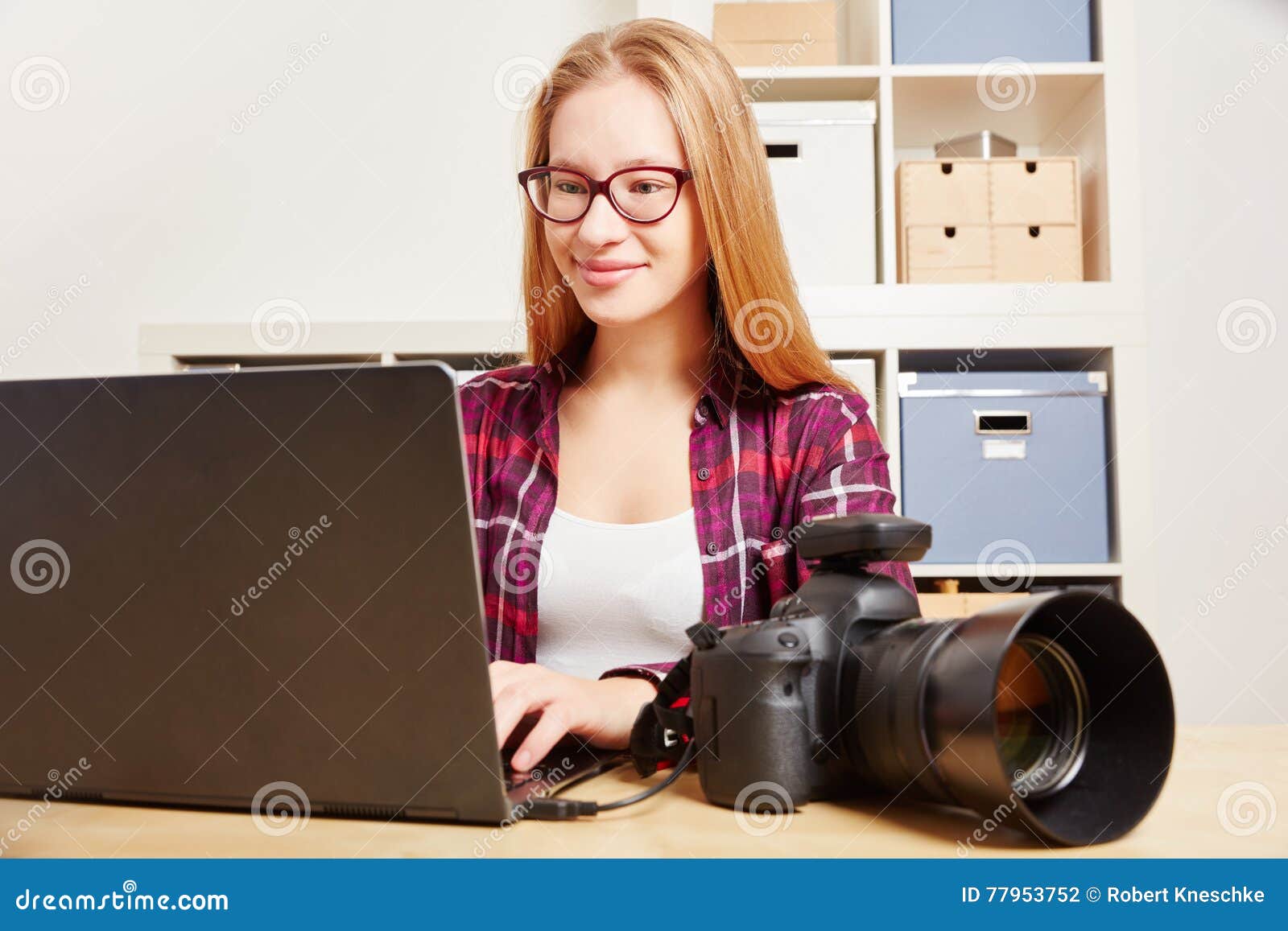 Photographer with Camera and Computer Stock Photo - Image of table ...