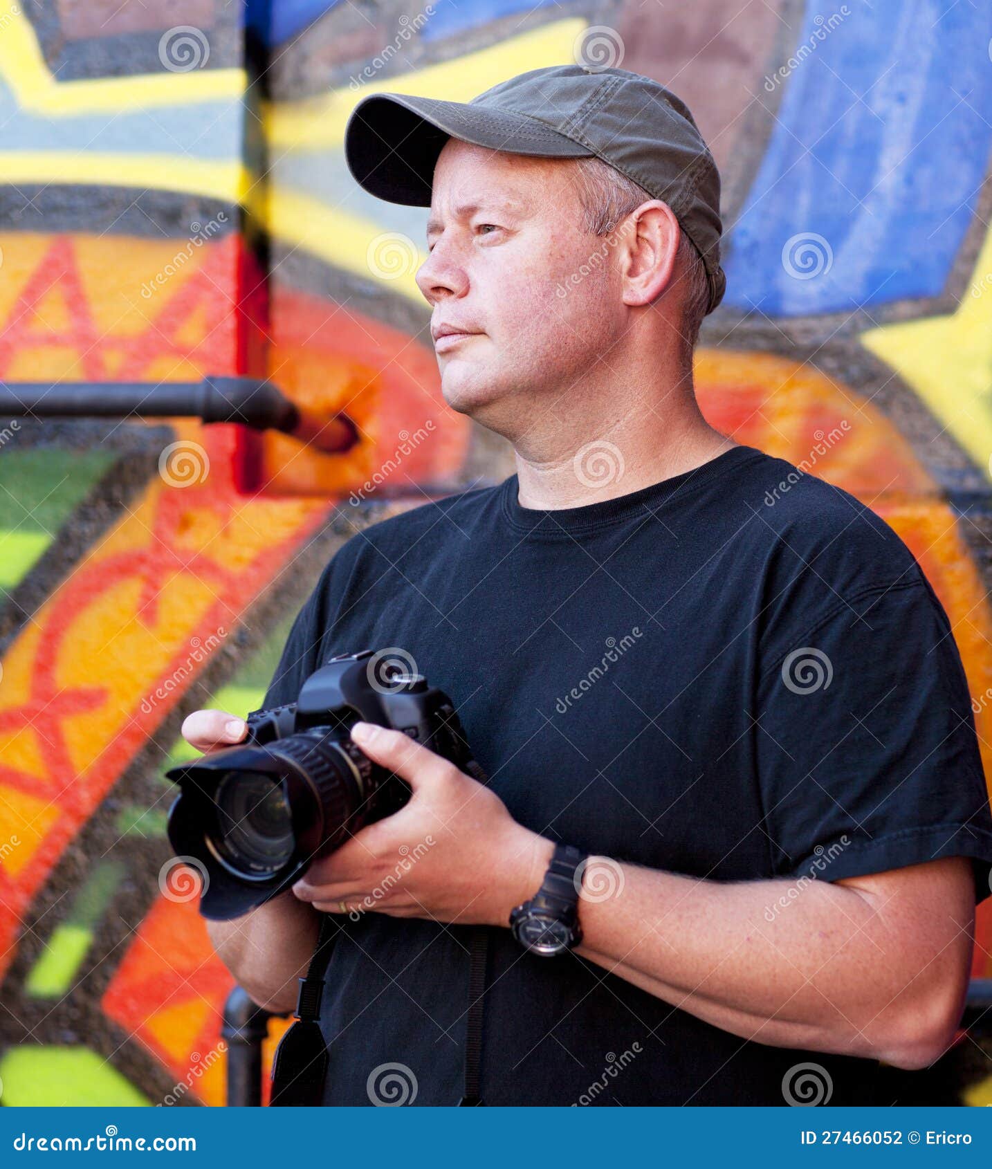 Photographer with Camera Near Graffiti Background Stock Photo - Image ...