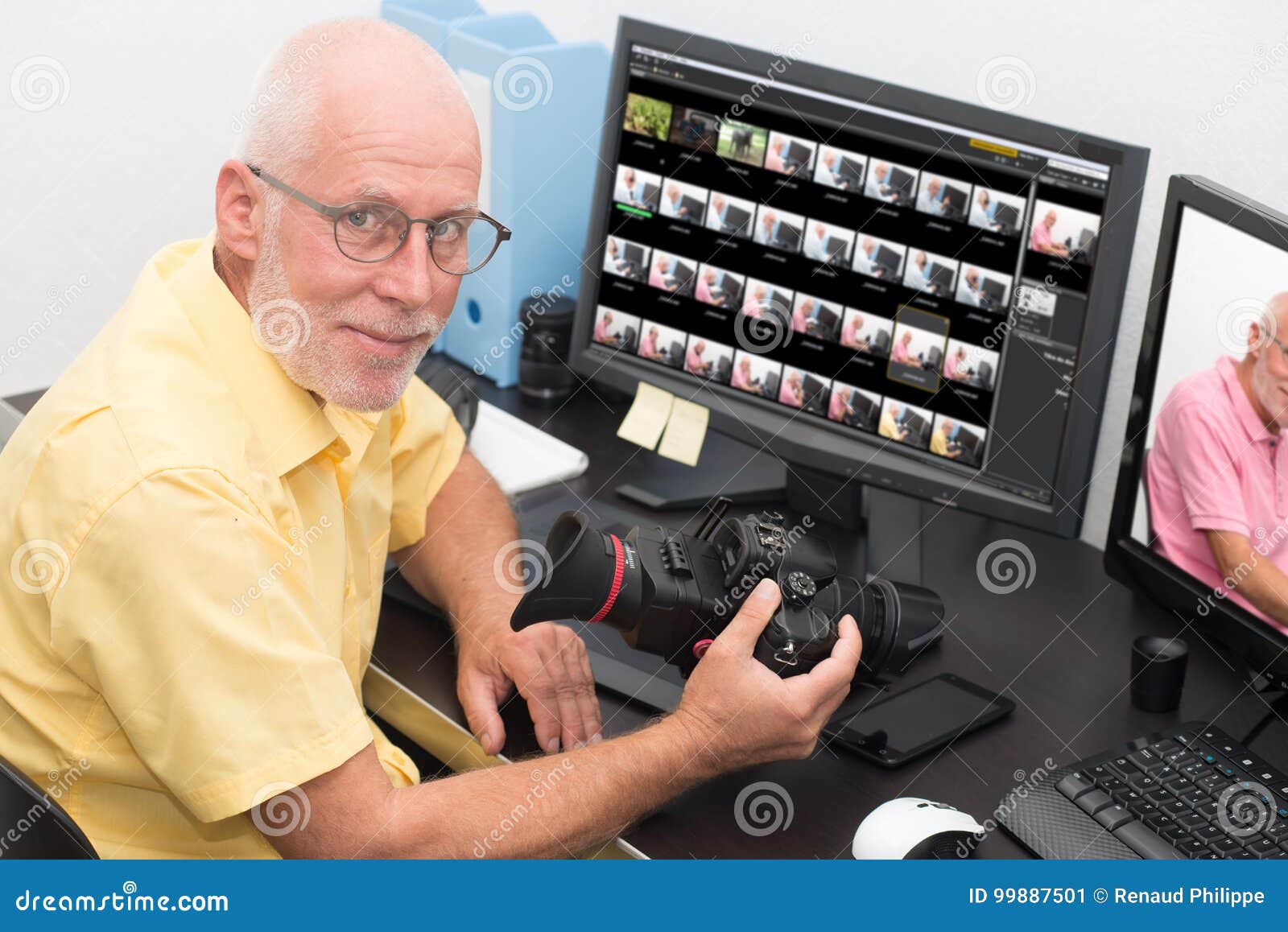 Photographer with Camera at Office with Computer Stock Image - Image of ...