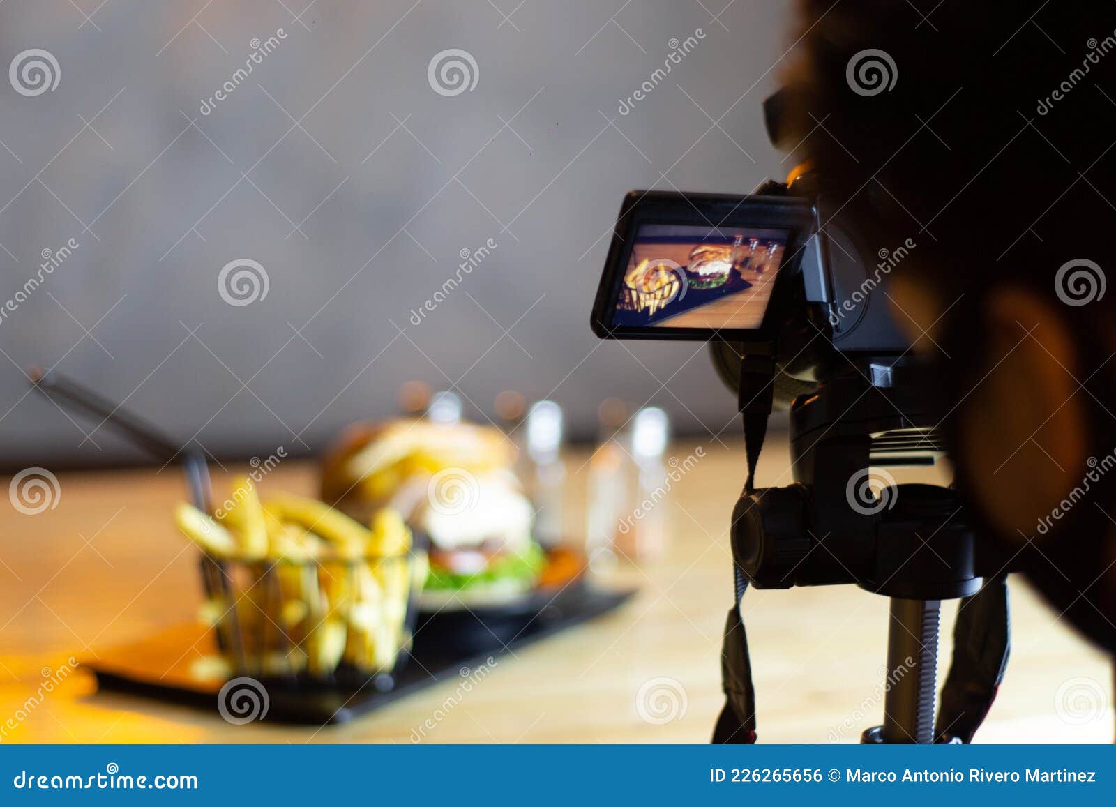 Photographer with a Camera in a Restaurant Stock Photo - Image of smile ...