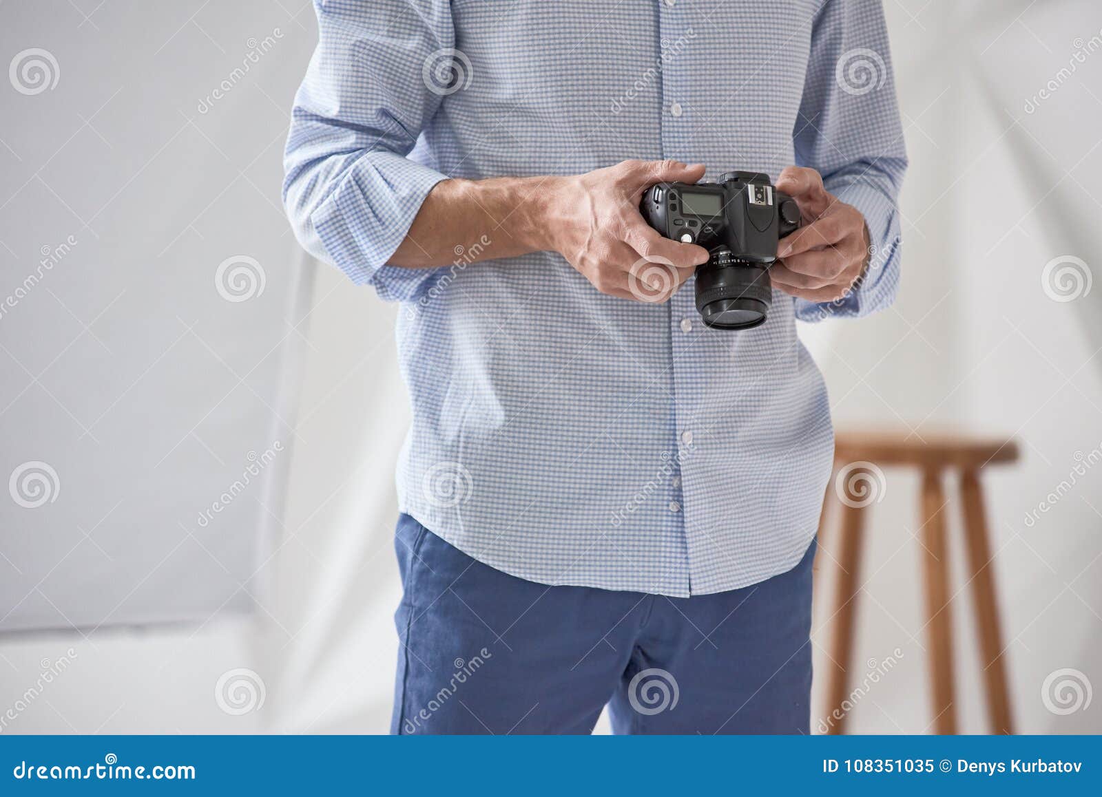 Photographer Checking Camera Stock Image - Image of camera, equipment ...