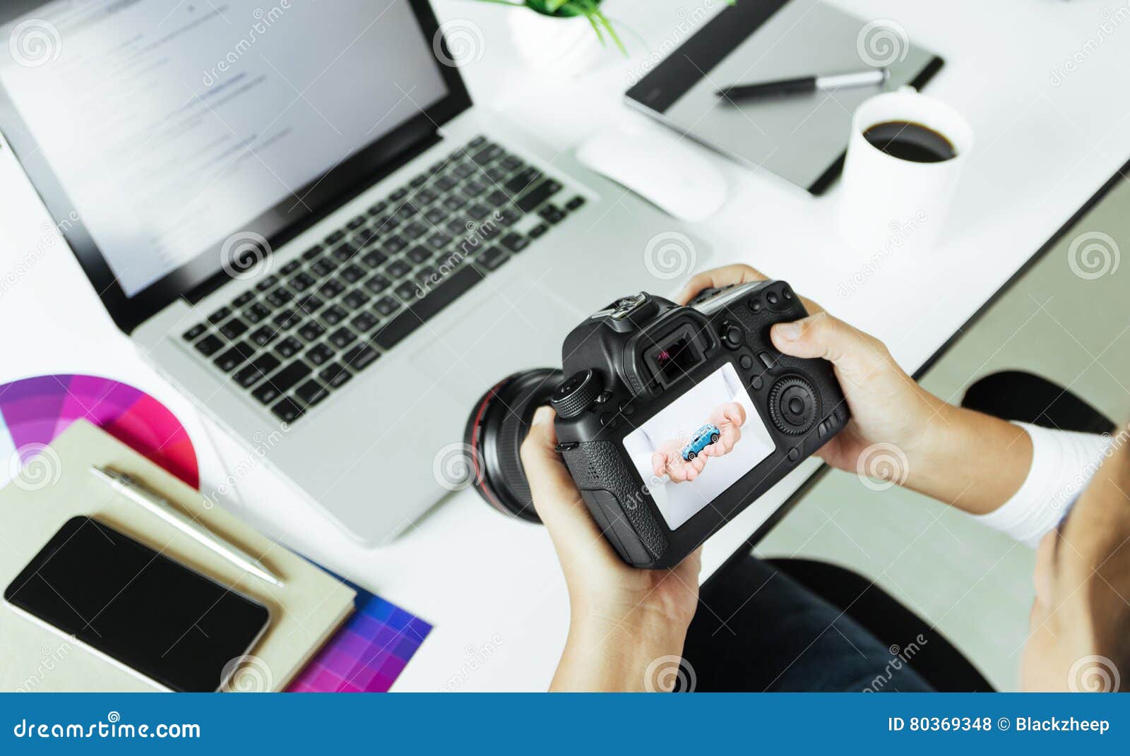 Photographer Checking Camera on Desk Stock Photo - Image of iphone ...