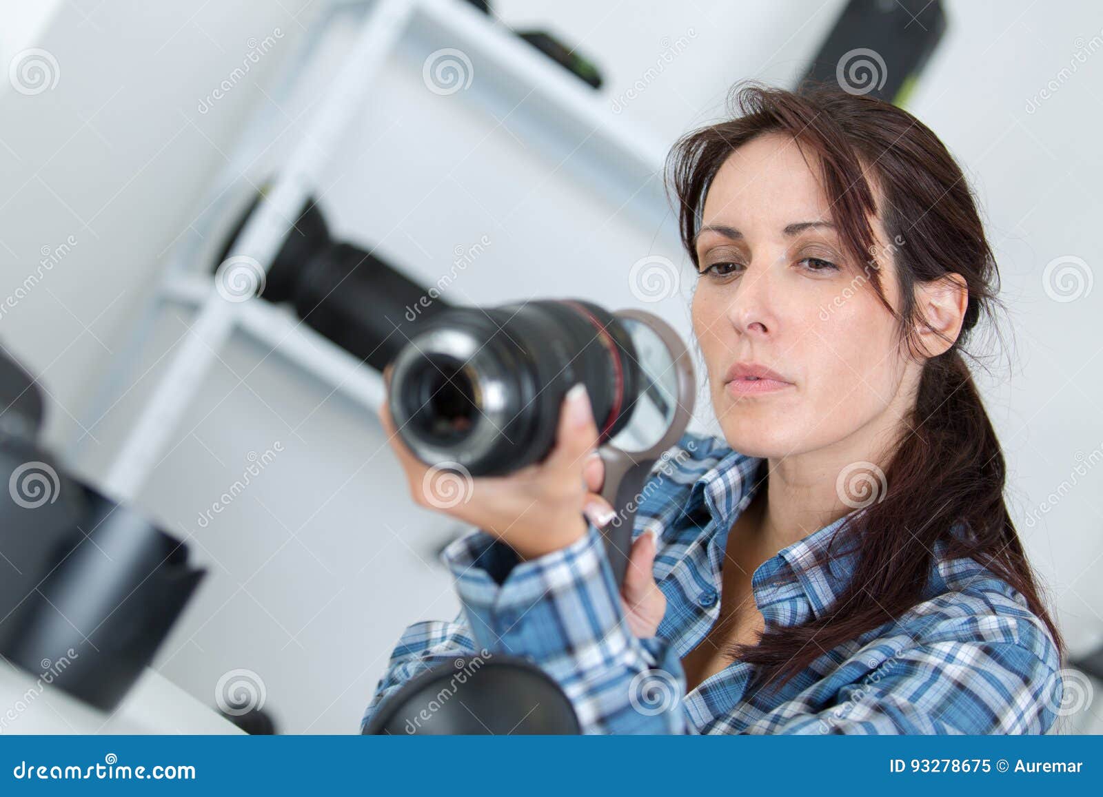Photographer Checking Lens with Magnifying Glass Stock Image - Image of ...