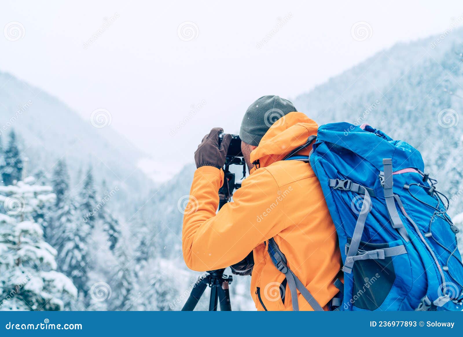 Photographer Dressed Orange Softshell Jacket with Backpack Making a ...