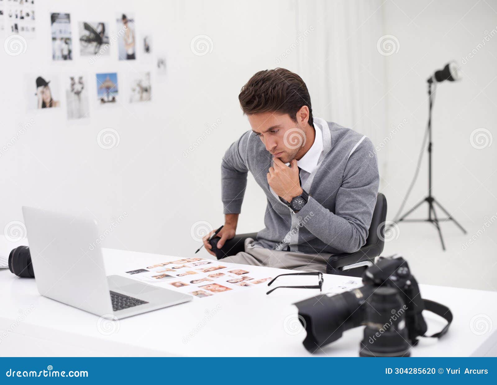 Photographer, Editing and Thinking with Computer in Office with Working ...