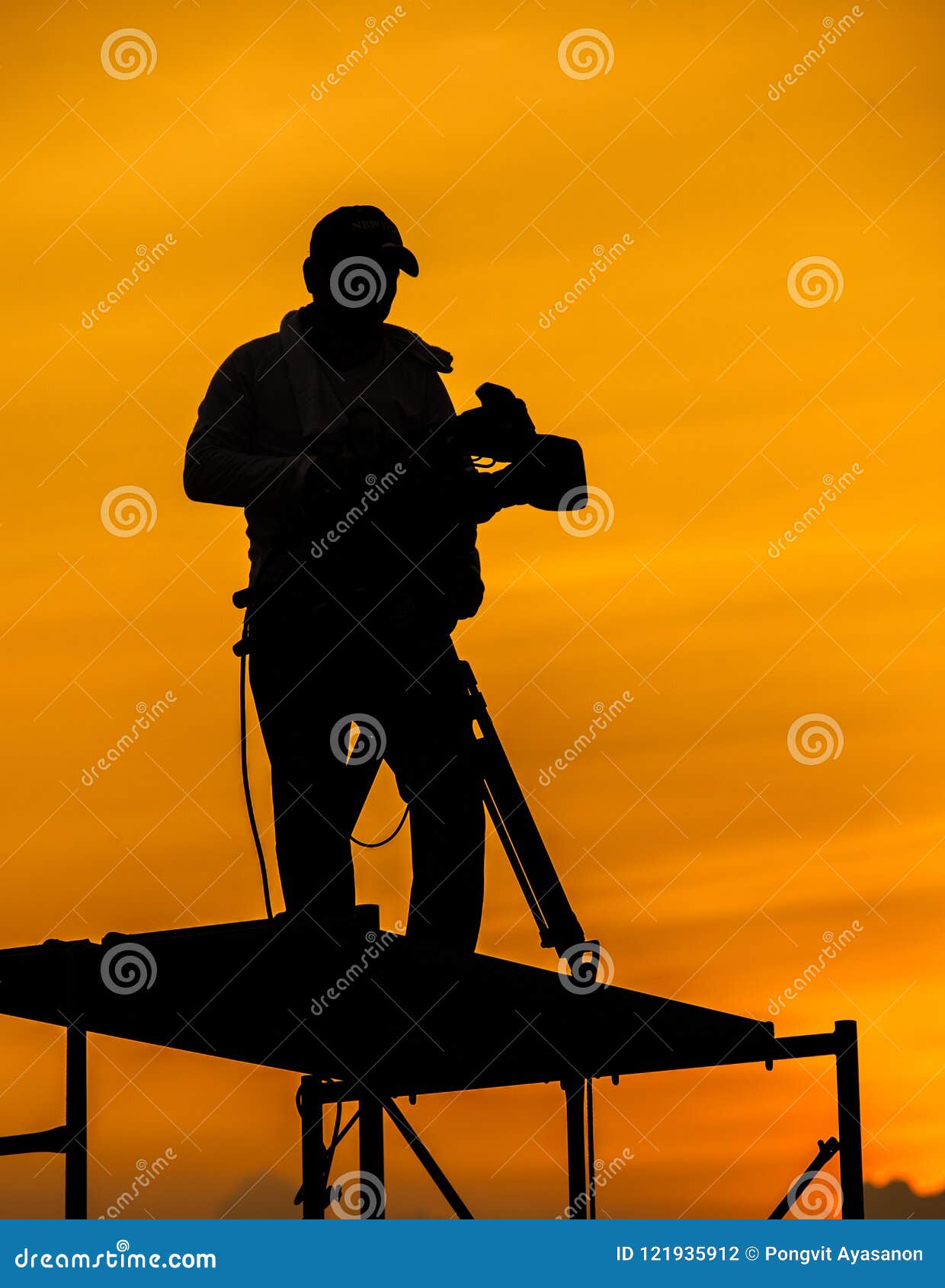 Cameraman with sunset stock photo. Image of colorful - 121935912