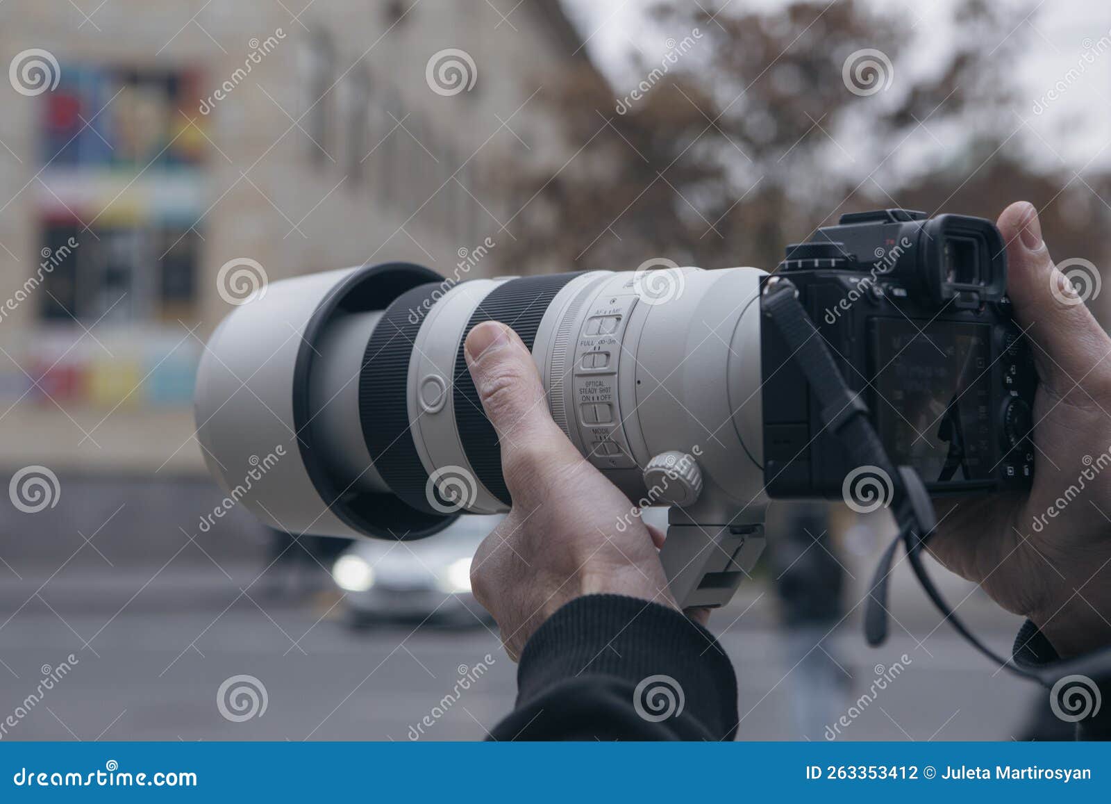 Photographer Holding a Camera Stock Photo - Image of nature, person ...