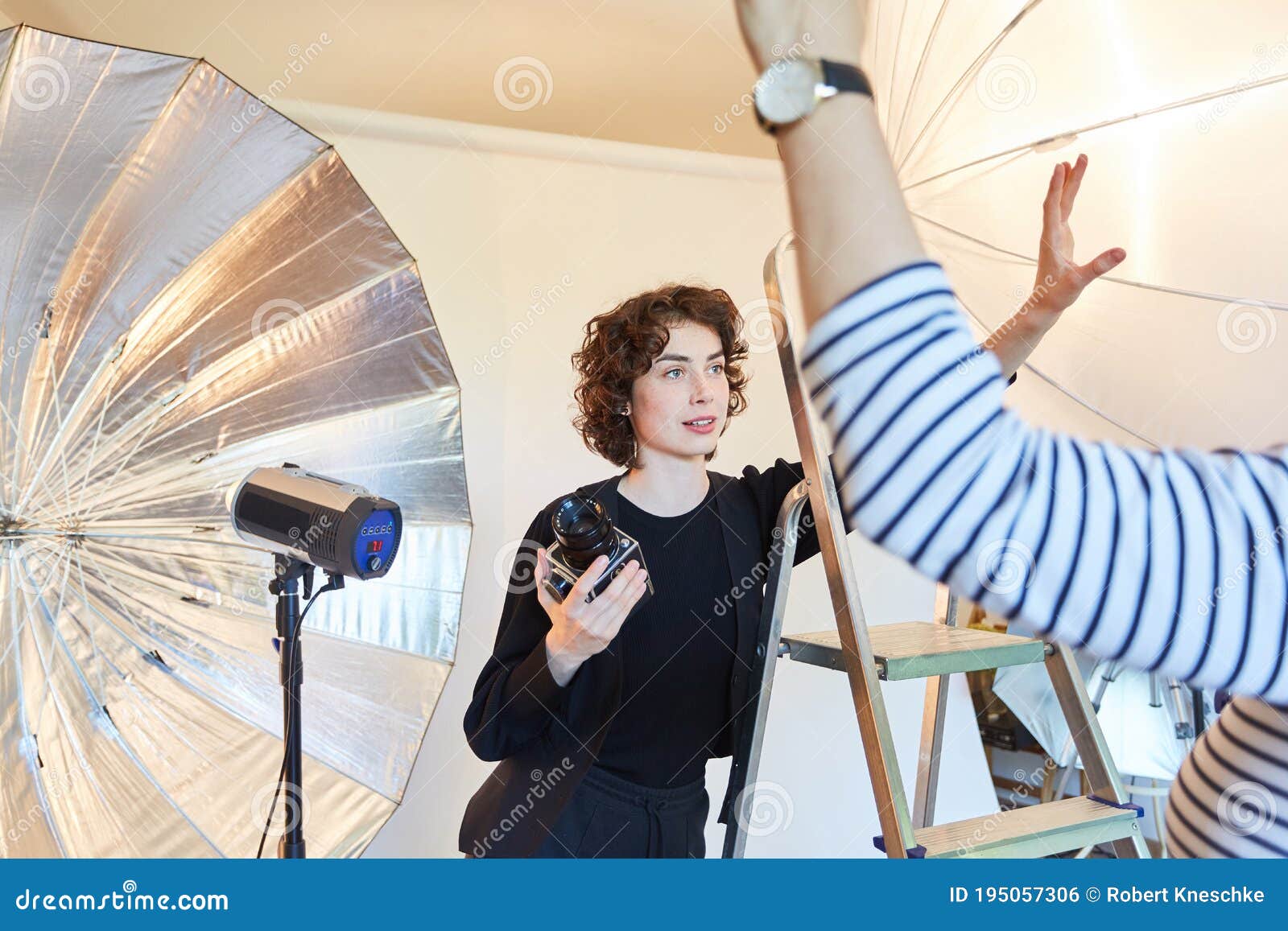 Photographer with Medium Format Camera in Front of the Flash Unit Stock ...