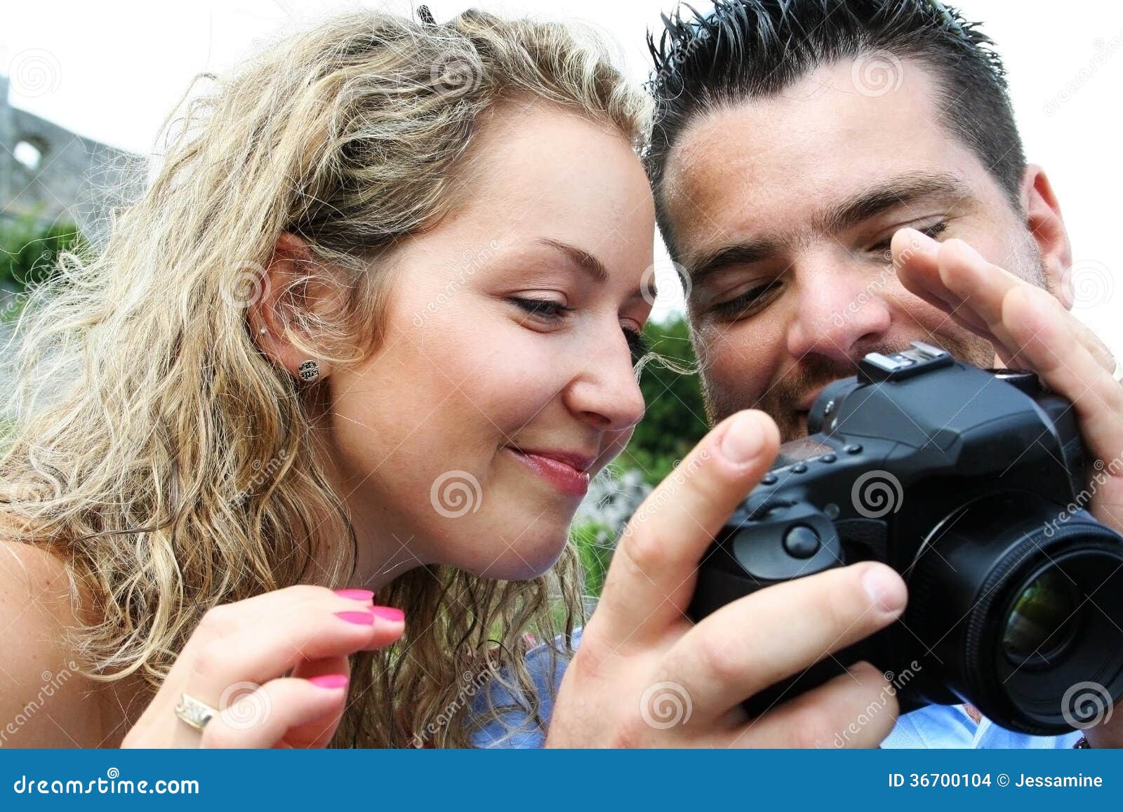 Photographer and Model Checking Photos Stock Photo - Image of caucasian ...