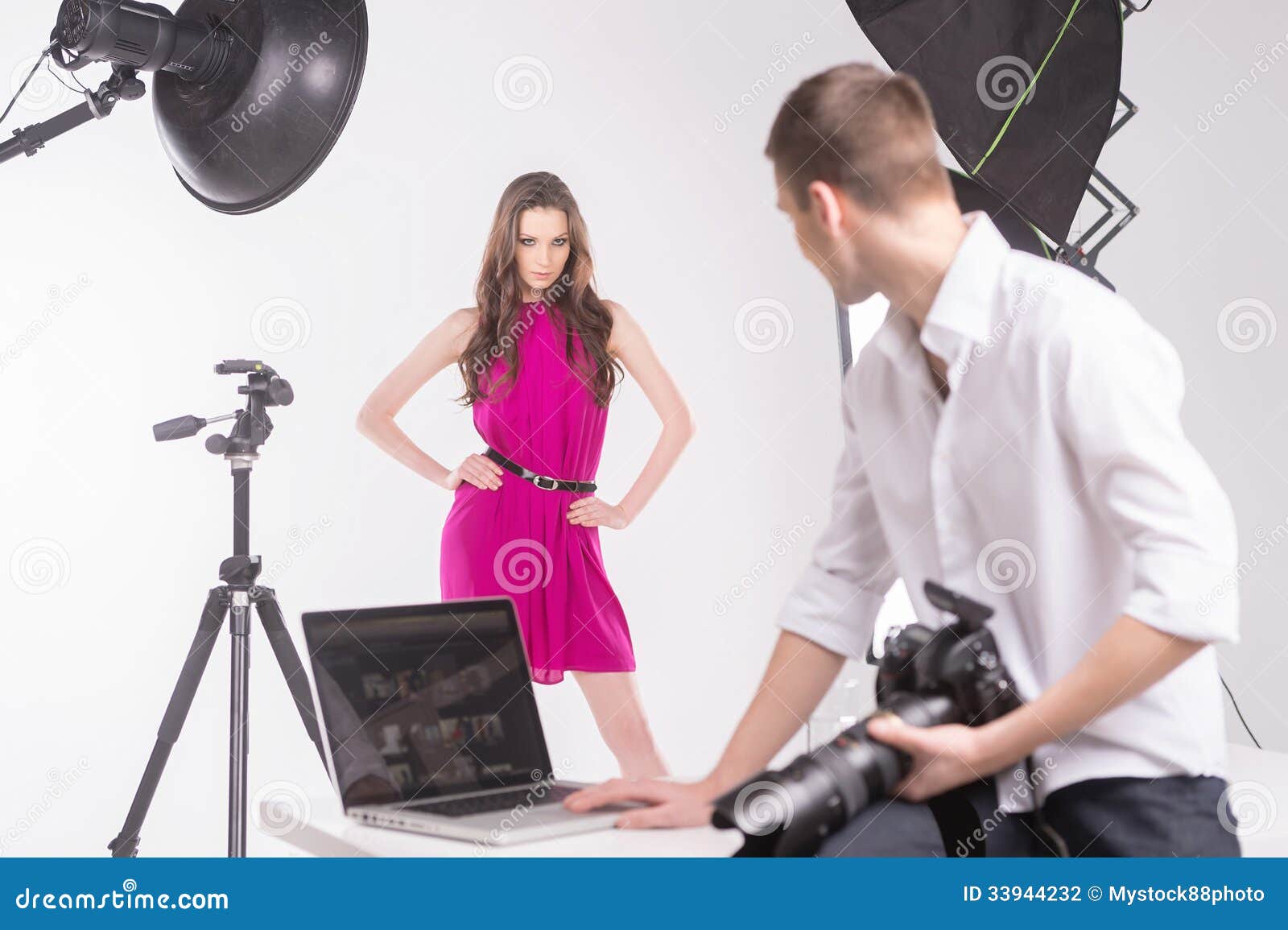 Photographer and model. stock photo. Image of fashion - 33944232