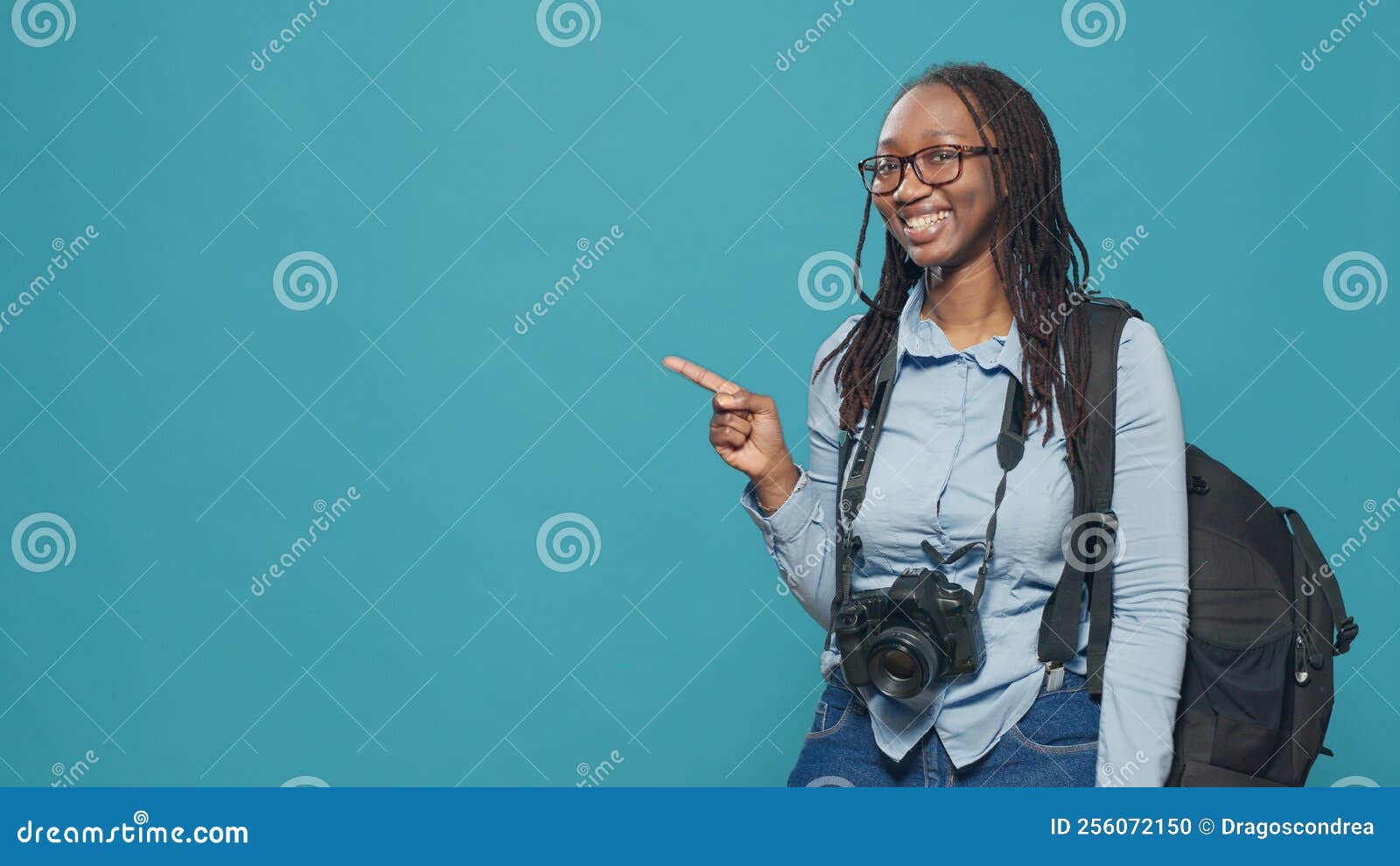 Photographer Pointing at Left and Right Side in Studio Stock Photo ...