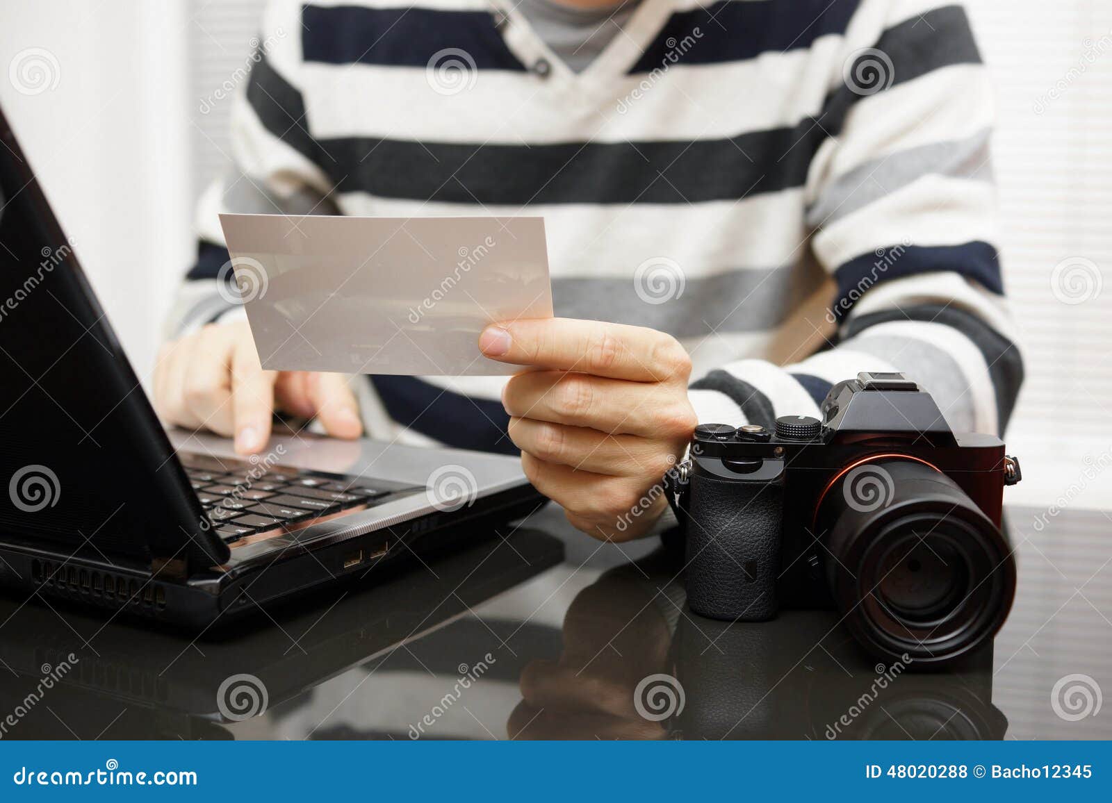 Photographer Reviewing the Image in the Workplace Stock Photo - Image ...