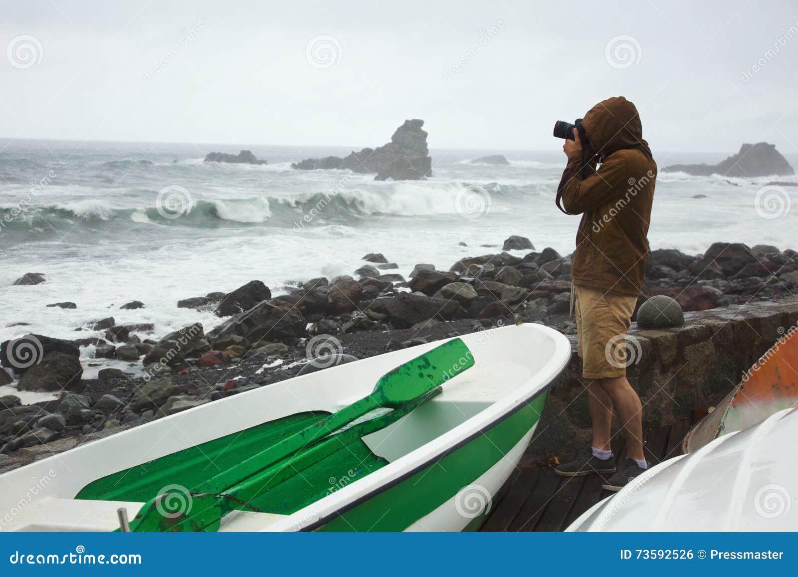 Photographer by seaside stock photo. Image of getaway - 73592526