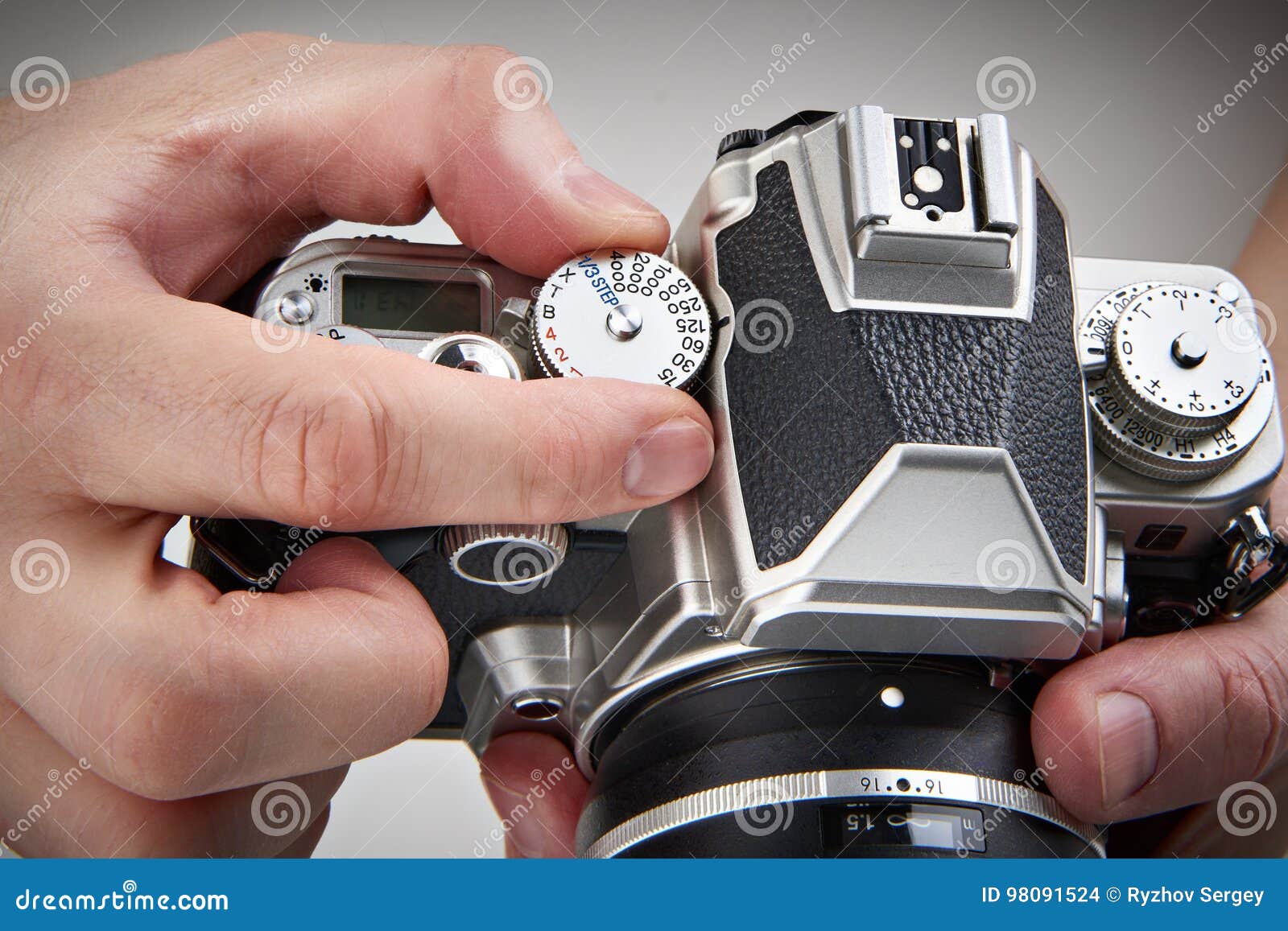 Photographer Setting Shutter Control Dial on Retro SLR Camera Stock ...