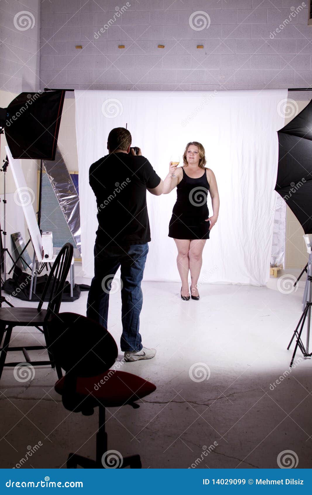 Photographer in the Studio stock image. Image of lighting - 14029099