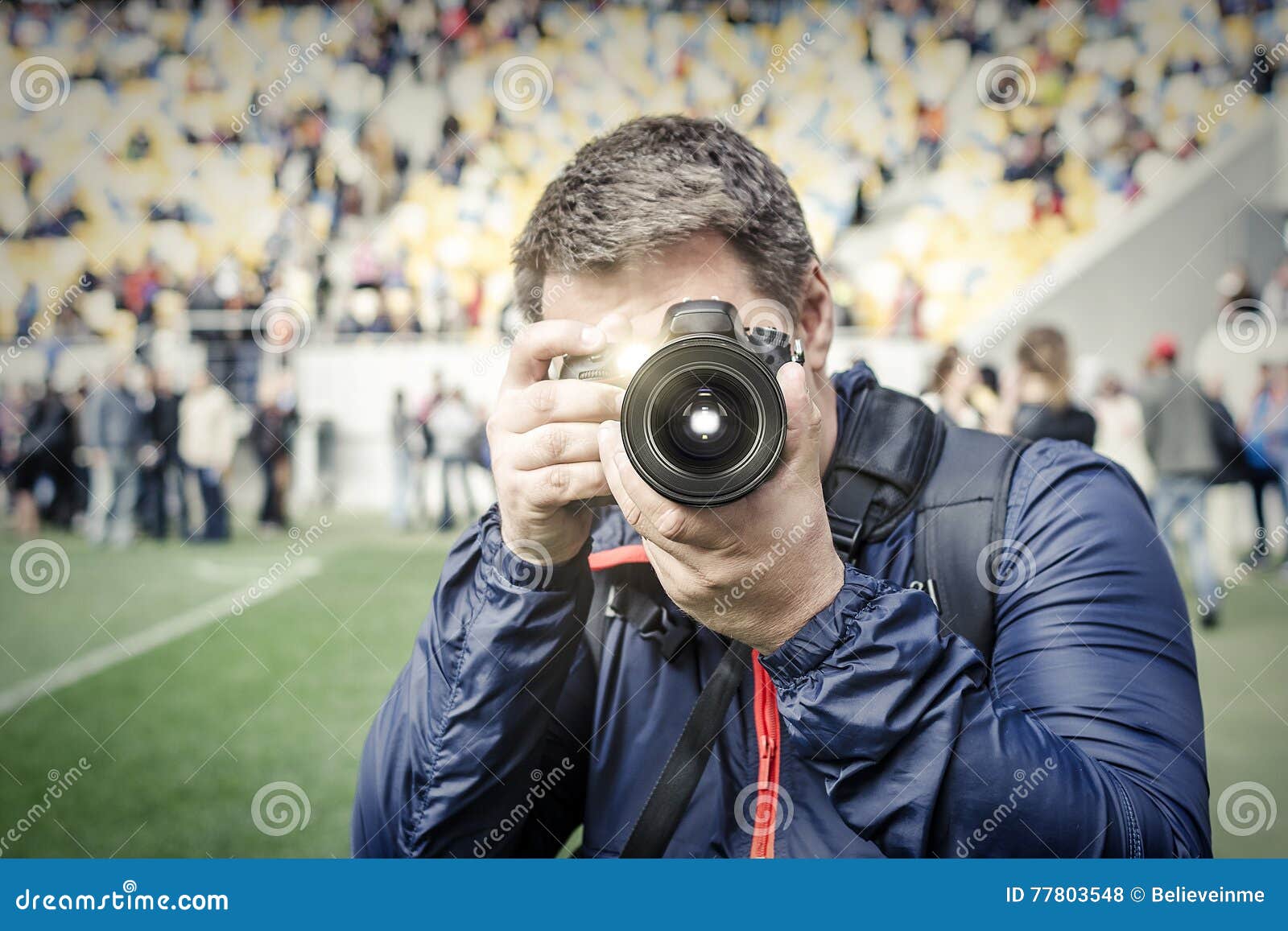 Photographer Takes a Photo at the Stadium. Stock Photo - Image of ...