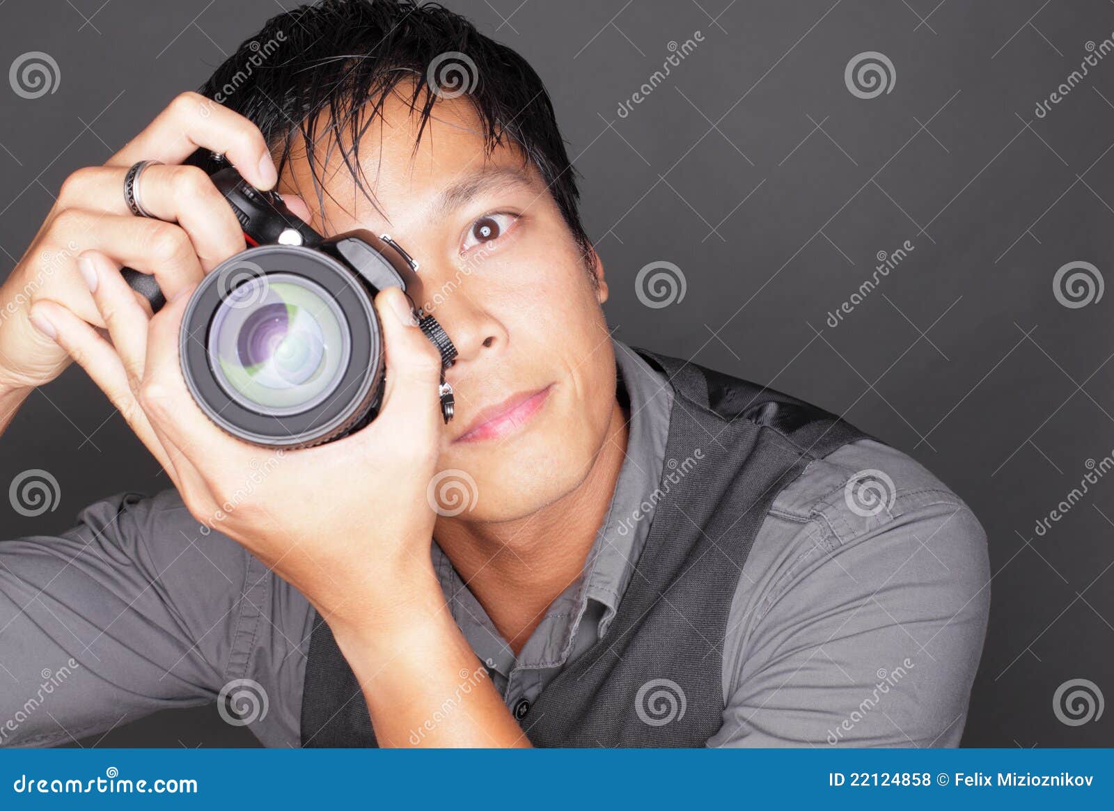 Photographer Taking a Photo Stock Photo - Image of vest, studio: 22124858