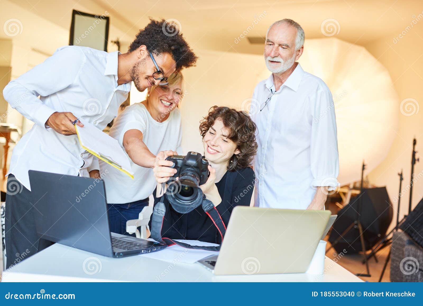 Photographer Team at a Meeting in the Photo Studio Stock Photo - Image ...