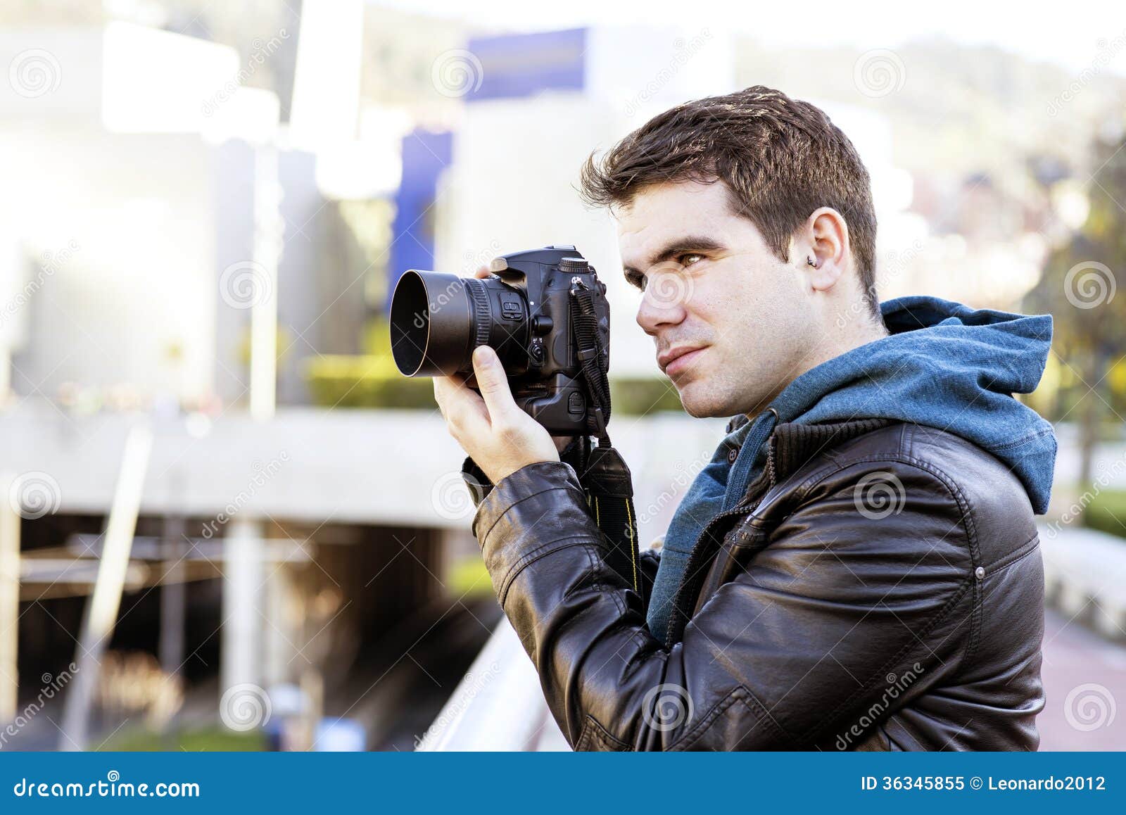 Photographer Using Camera in Public Space. Stock Image - Image of ...