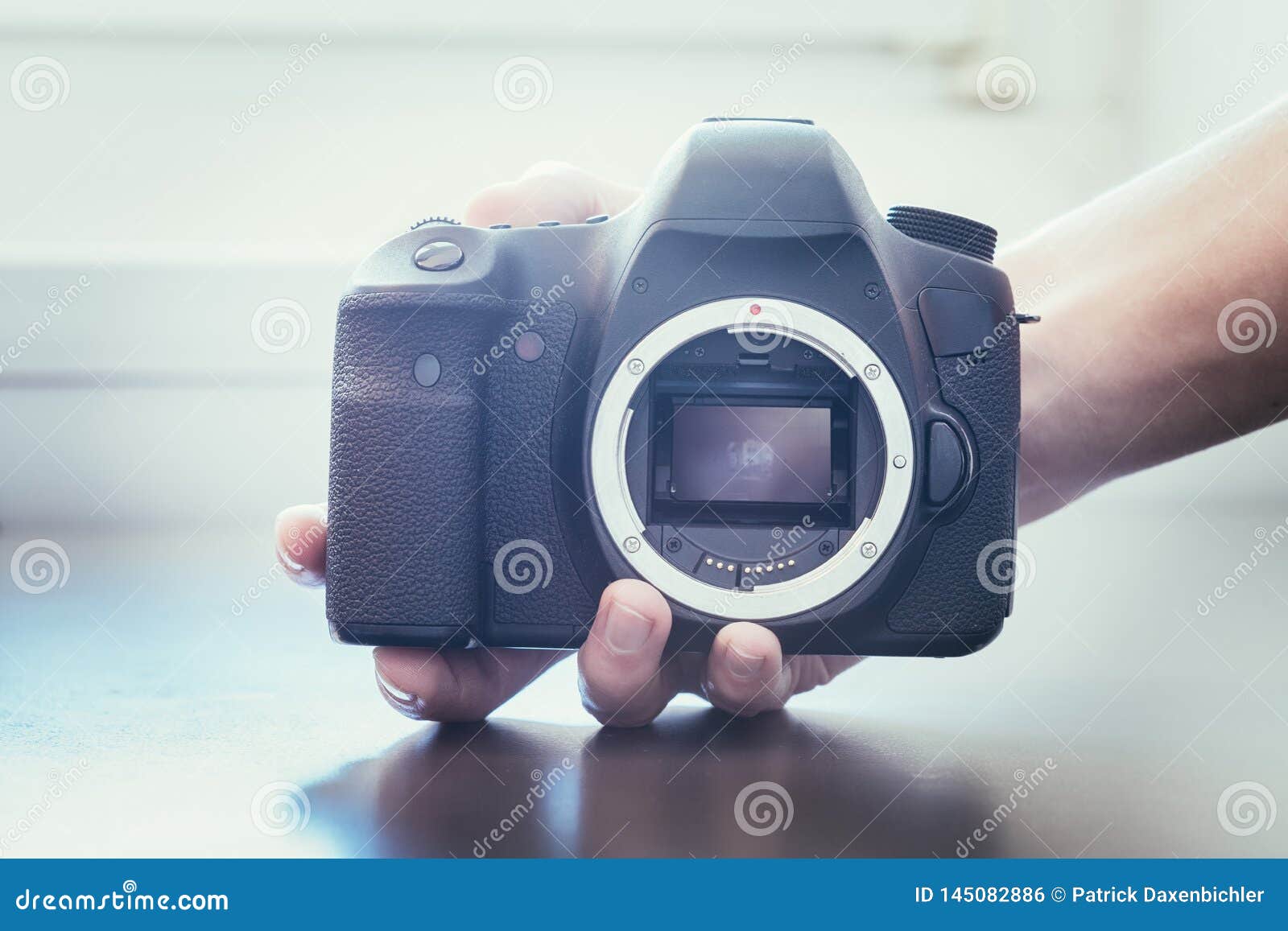 Photographer is Using a Professional Camera, Open Sensor Stock Photo ...
