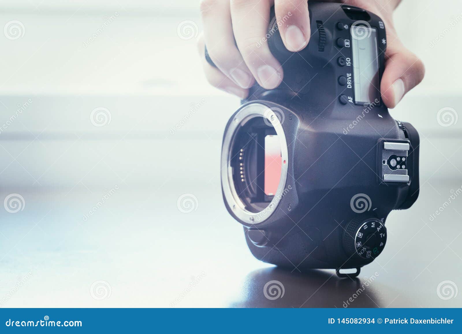 Photographer is Using a Professional Camera, Open Sensor Stock Photo ...