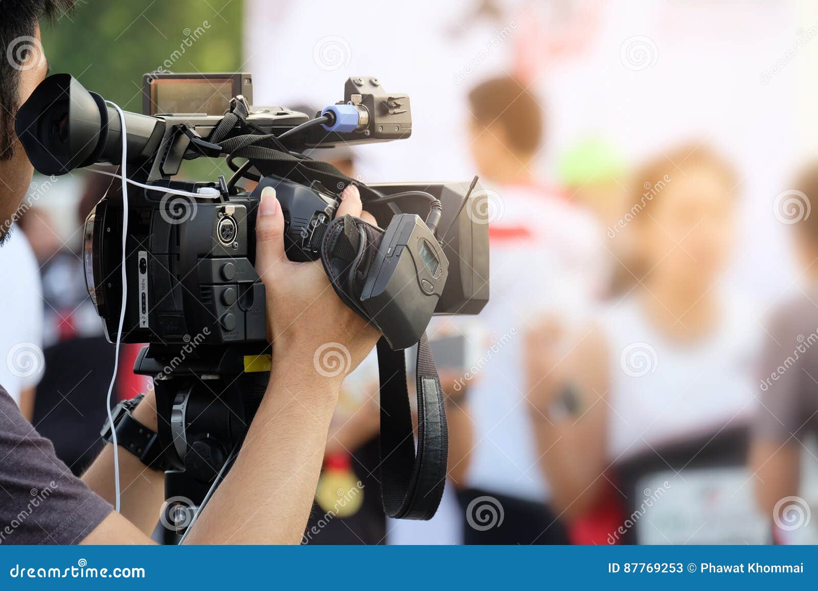 Video Recording Process. Operator Is Filming Young Man On A ...