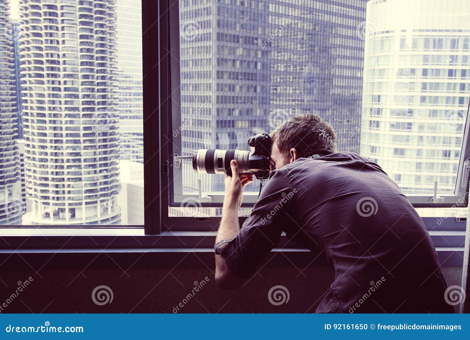 Photographer Window Shooting Chicago Sky Line Picture. Image: 92161650