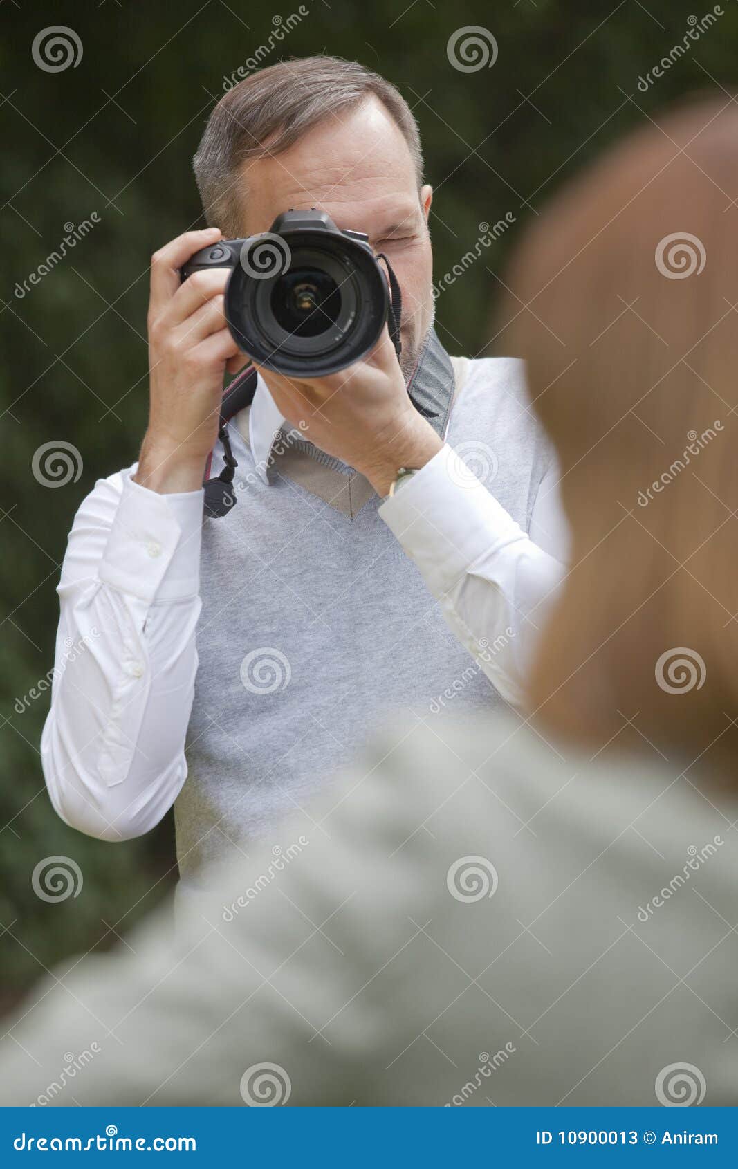 Photographer at work stock image. Image of woman, smiling - 10900013