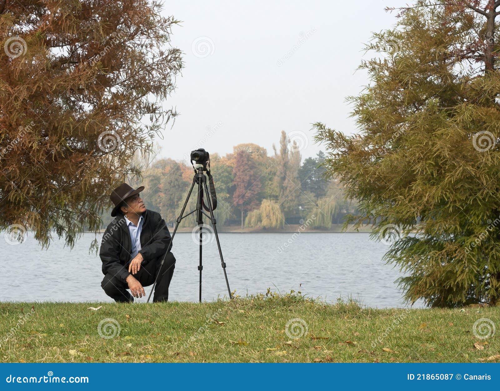 Photographer at work stock image. Image of black, preparing - 21865087