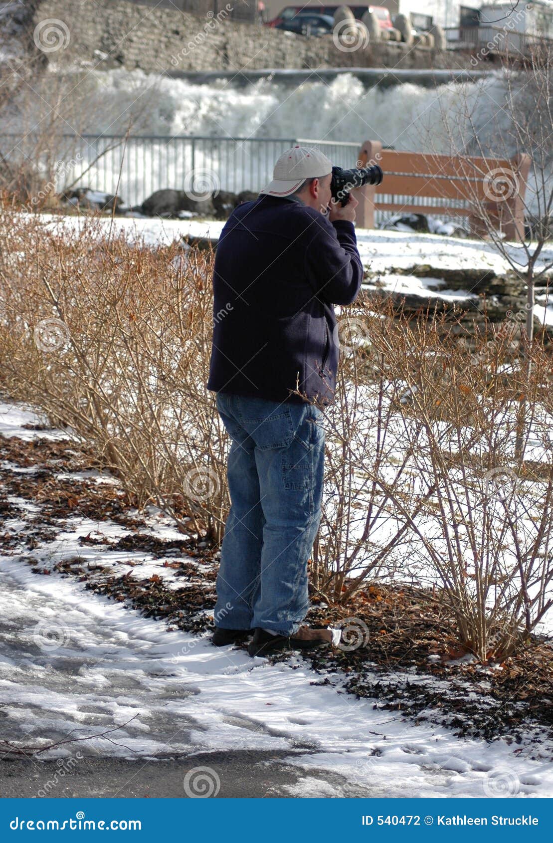 Photographer at Work stock photo. Image of bench, person - 540472