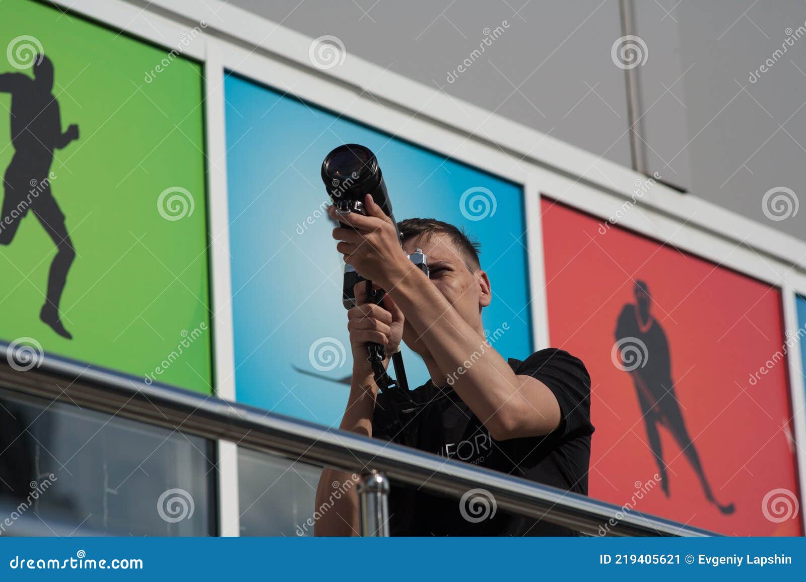 The Photographer at Work, the Photographer Checks the Footage, the ...
