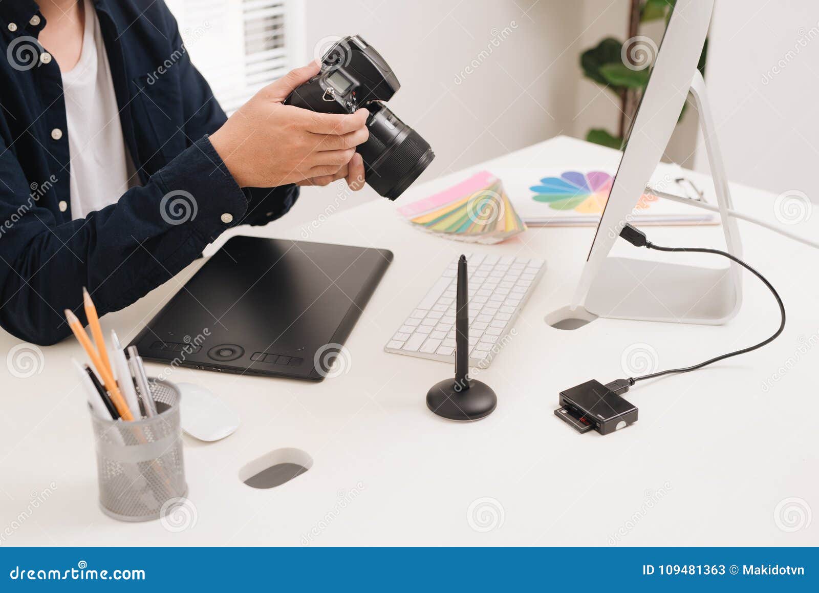 Photographer Working at Desk in Modern Office Stock Image - Image of ...